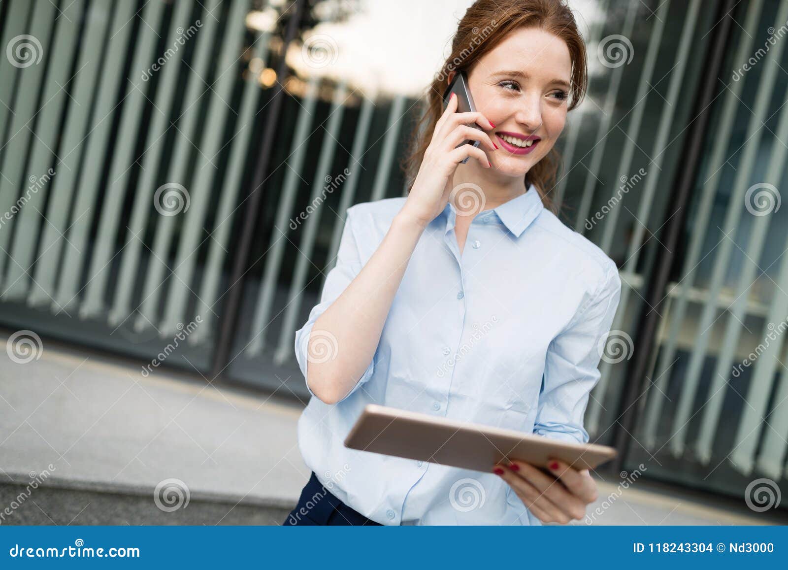 Attractive Young Businesswoman Using Mobile Phone Outside Stock Photo ... Attractive Young Businesswoman Using Mobile Phone Outside Stock Photo ...