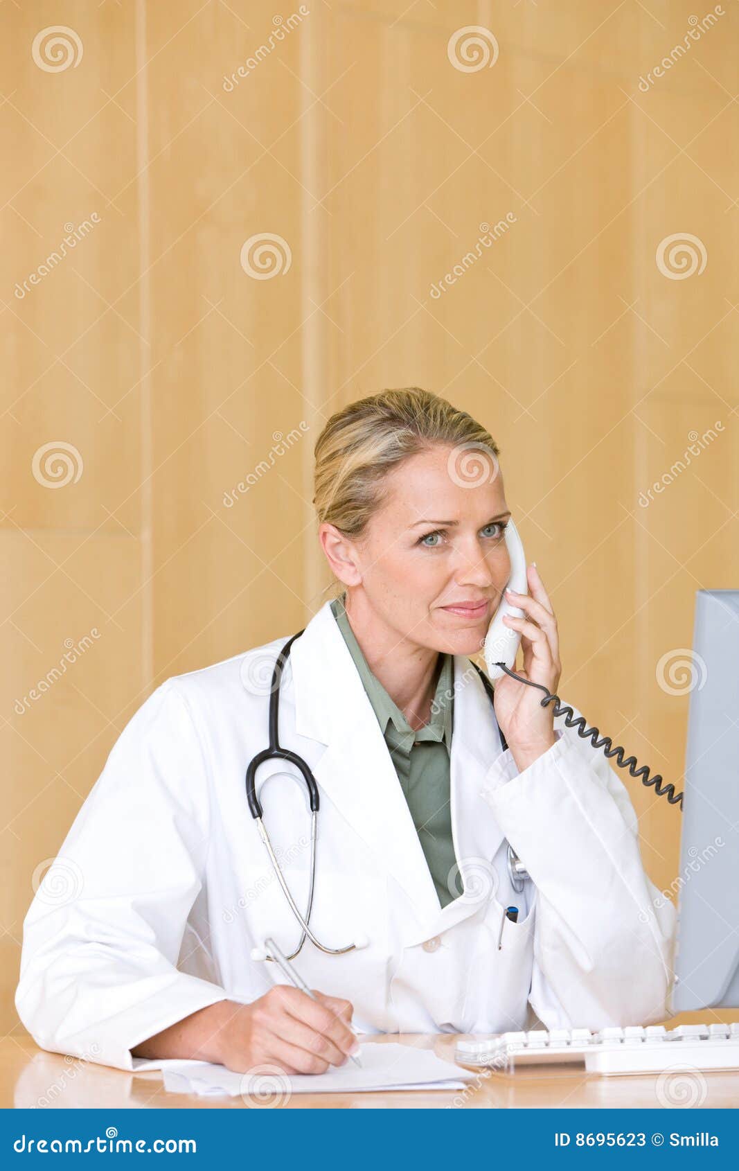 Attractive Young Caring Doctor Stock Image - Image of cute, clipboard ...