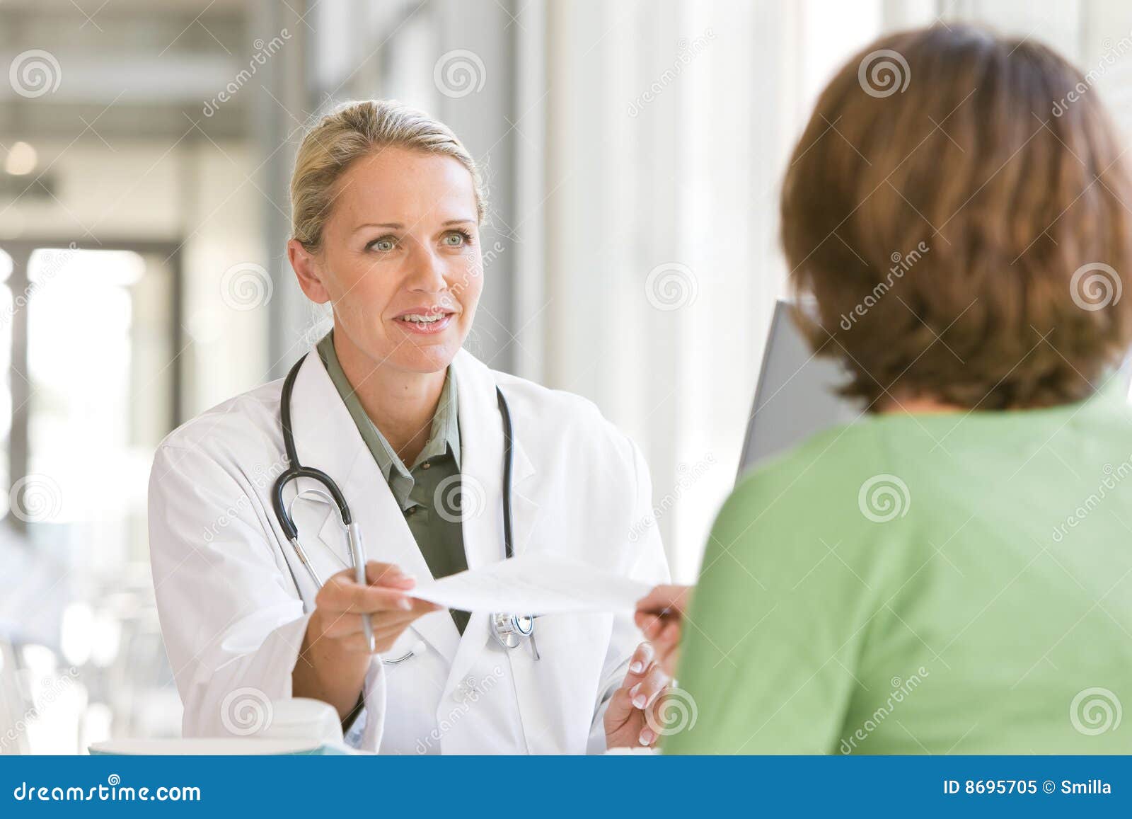 Attractive Young Caring Doctor Stock Image - Image of lifestyle ...