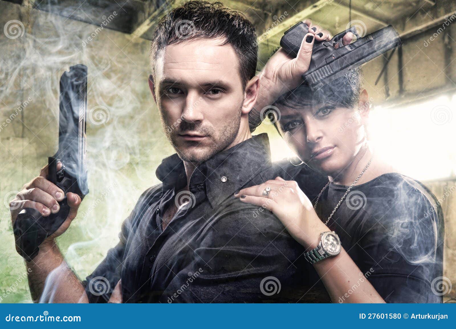 An Attractive Young Couple with Guns Stock Photo - Image of armed ...