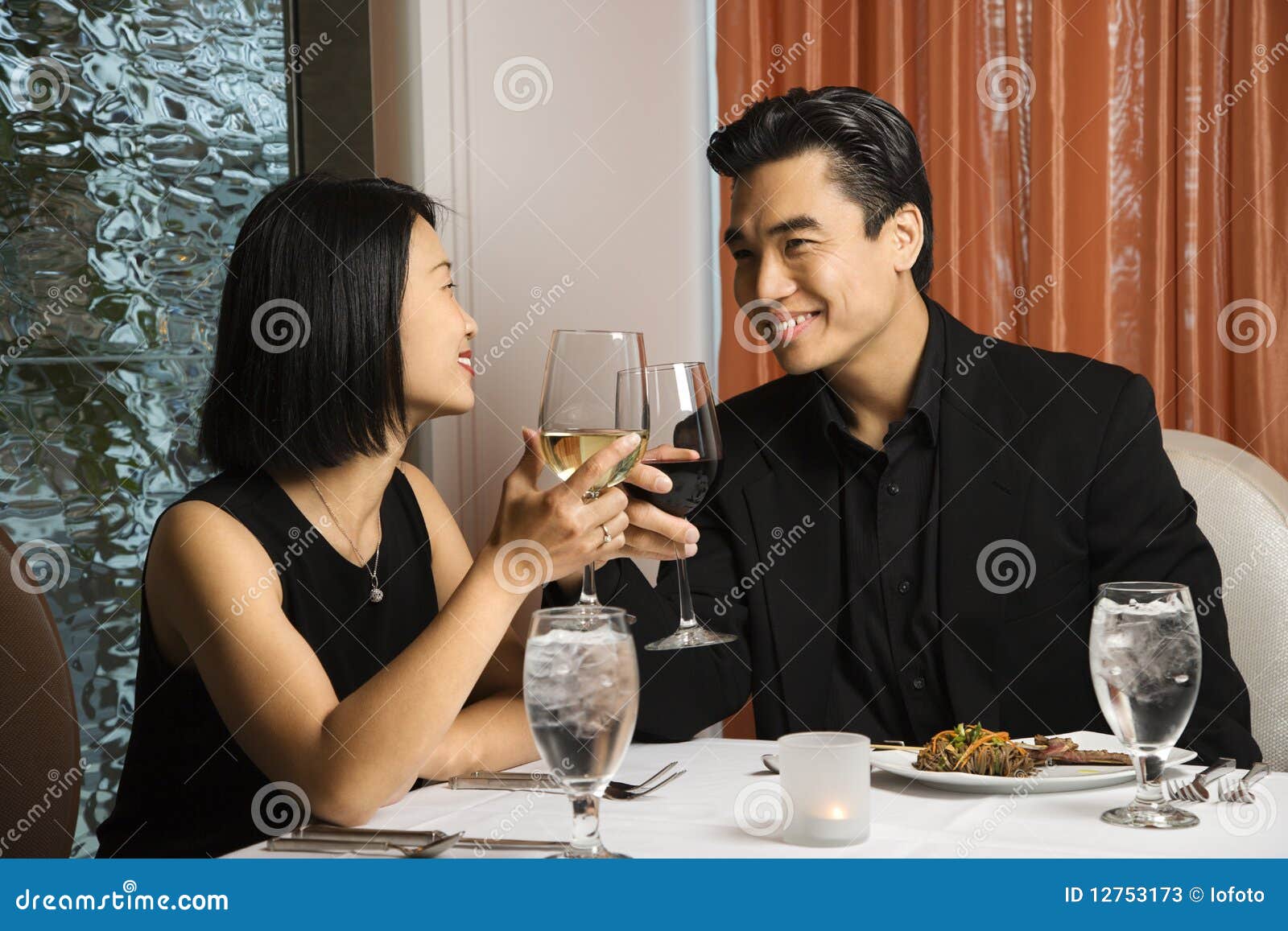 Attractive Young Couple Smiling at Each Other Stock Image - Image of ...