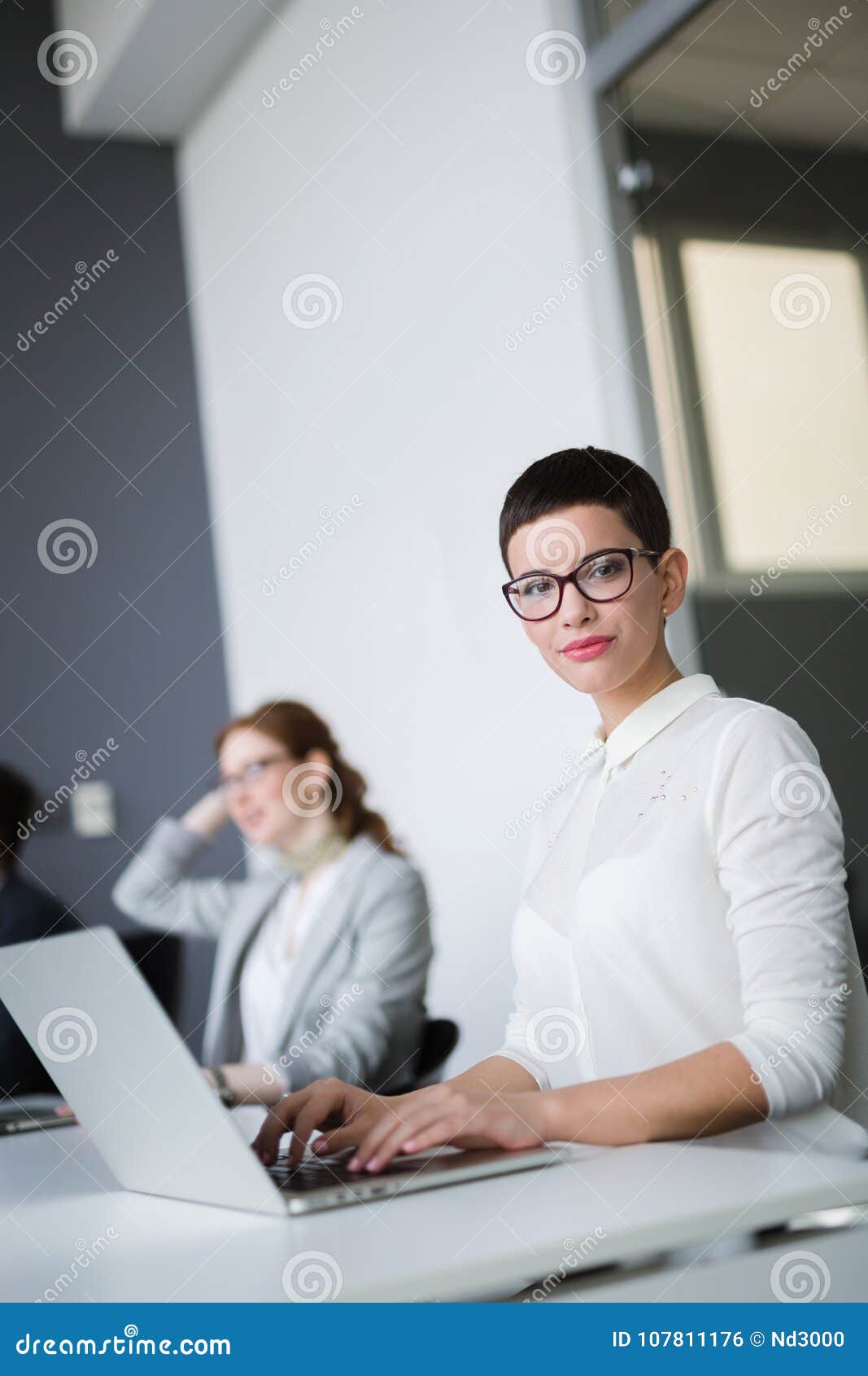 Attractive Young Female Architect Working on Laptop Stock Photo - Image ... Attractive Young Female Architect Working on Laptop Stock Photo - Image ...