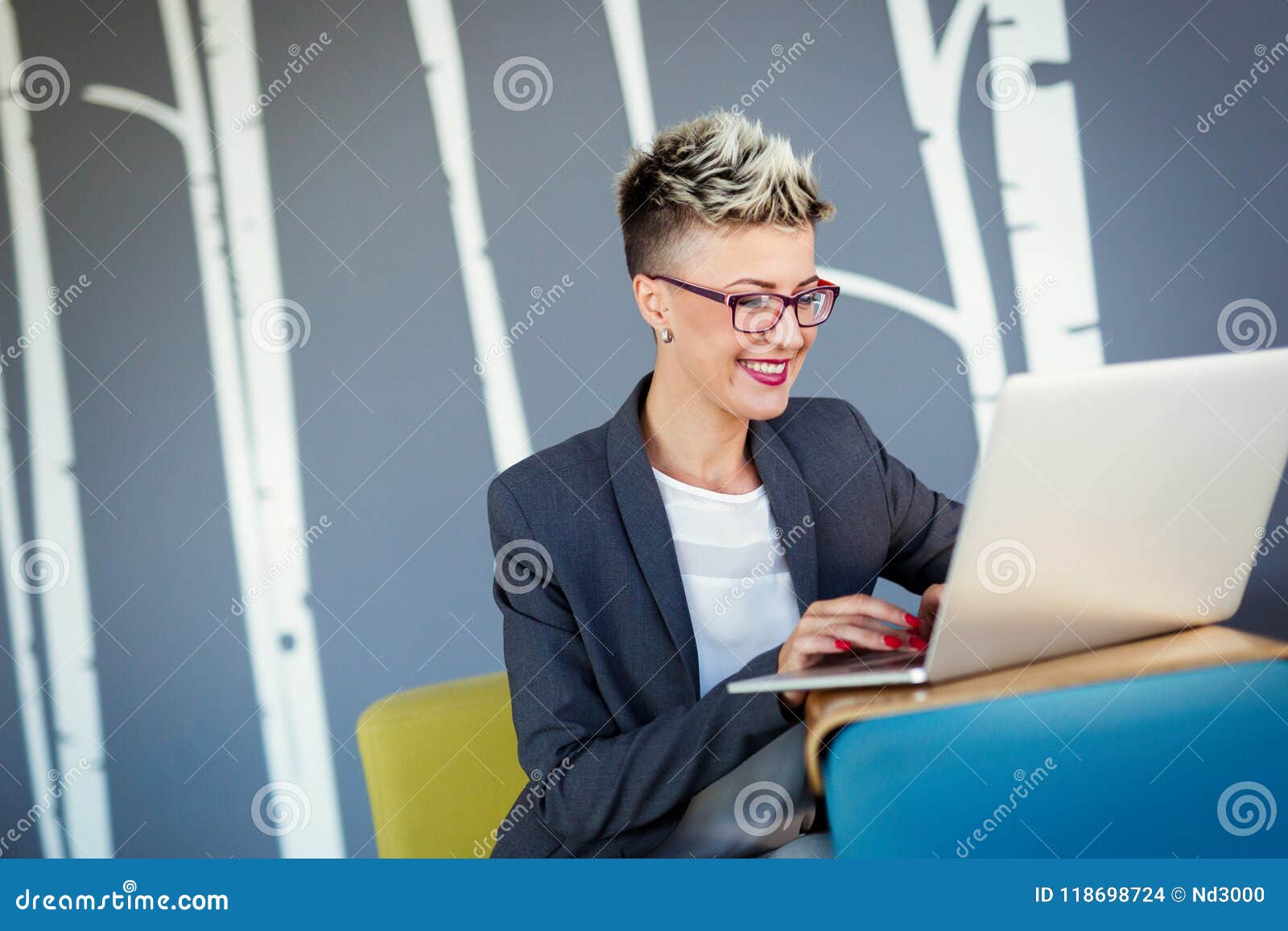 Attractive Young Female Architect Working on Laptop Stock Photo - Image ... Attractive Young Female Architect Working on Laptop Stock Photo - Image ...