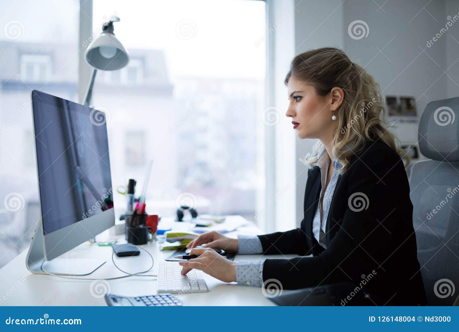 Attractive Young Female Architect Working on Laptop Stock Photo - Image ... Attractive Young Female Architect Working on Laptop Stock Photo - Image ...