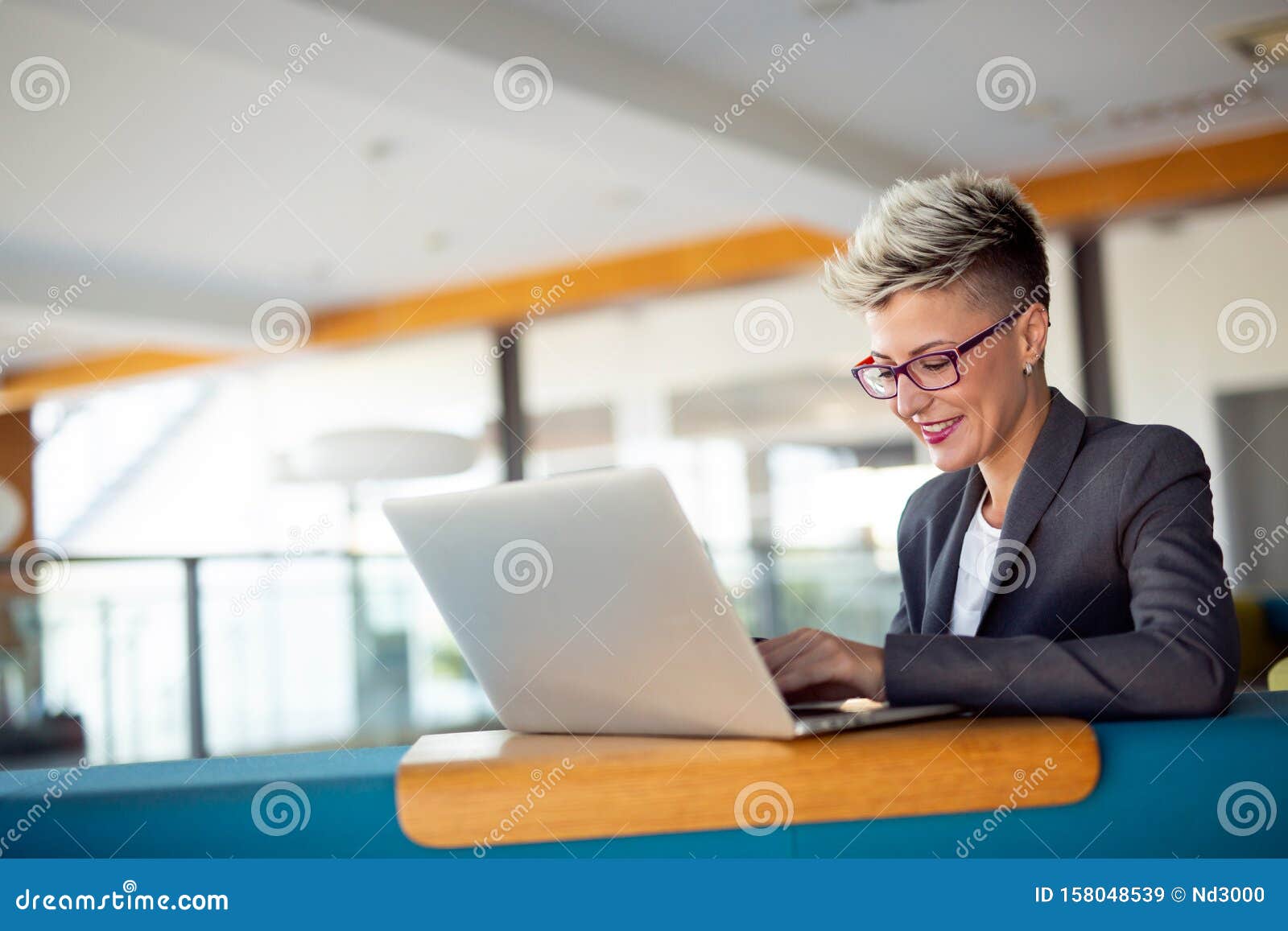 Attractive Young Female Architect Working on Laptop Stock Image - Image ... Attractive Young Female Architect Working on Laptop Stock Image - Image ...