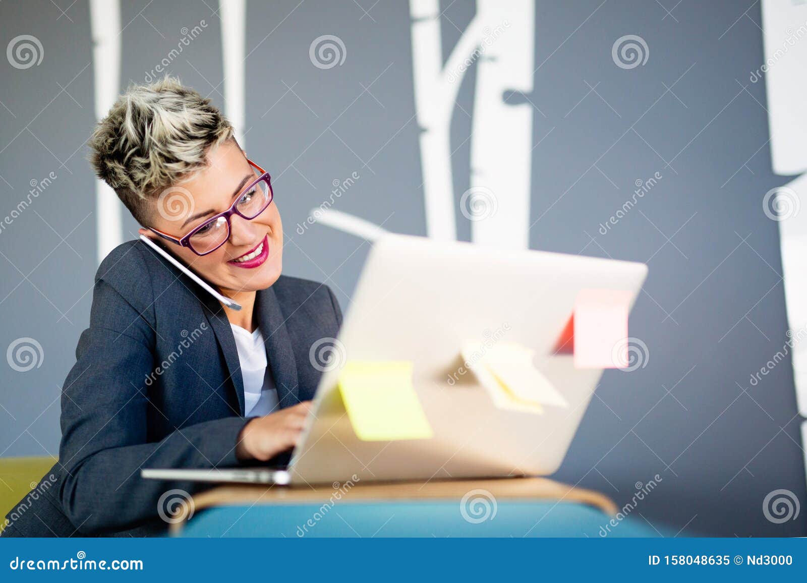 Attractive Young Female Architect Working on Laptop Stock Image - Image ... Attractive Young Female Architect Working on Laptop Stock Image - Image ...
