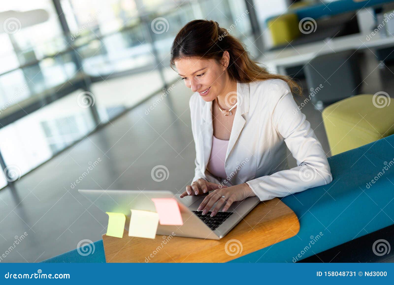 Attractive Young Female Architect Working on Laptop Stock Image - Image ... Attractive Young Female Architect Working on Laptop Stock Image - Image ...