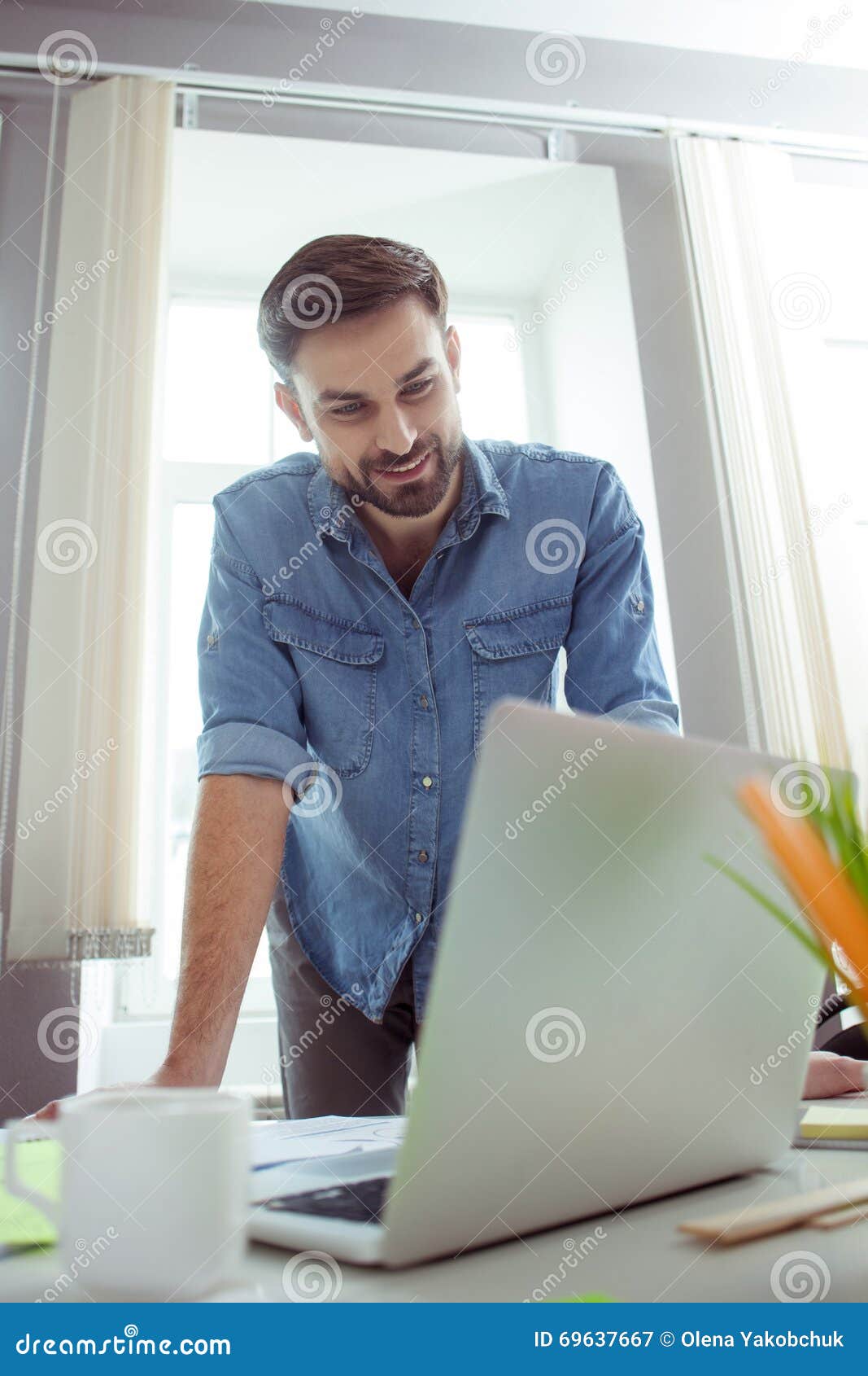 Attractive Young Guy is Working on Computer Stock Image - Image of ...