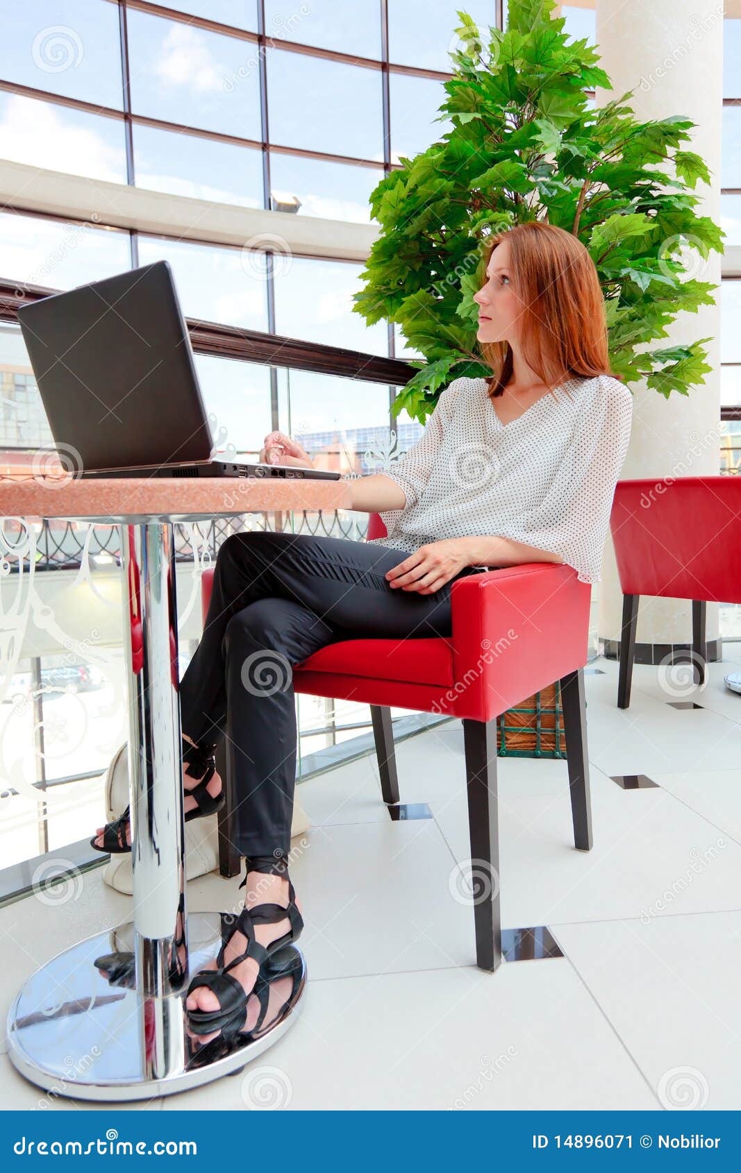An Attractive Young Lady Using Her Laptop Stock Image - Image of ...