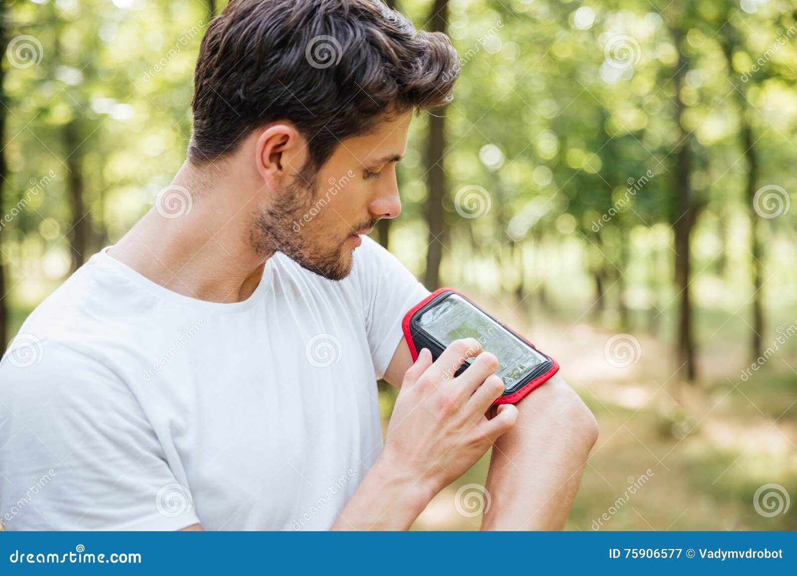 Attractive Young Man Athlete Using Mobile Phone in Handband Stock Image ...