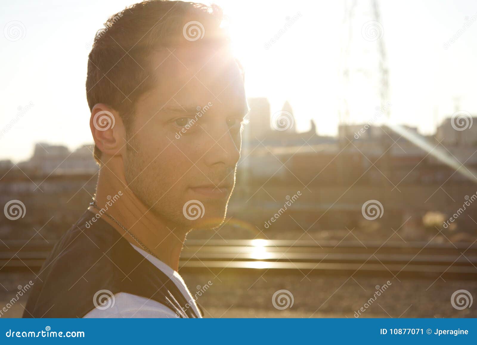 Attractive Young Man Backlit Stock Image - Image of hair, color: 10877071