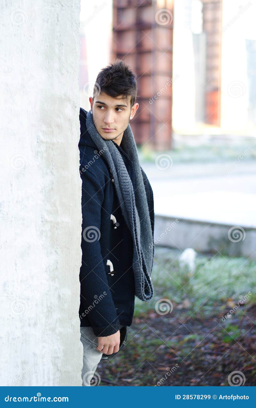 Attractive Young Man Behind White Wall Stock Image - Image of human ...
