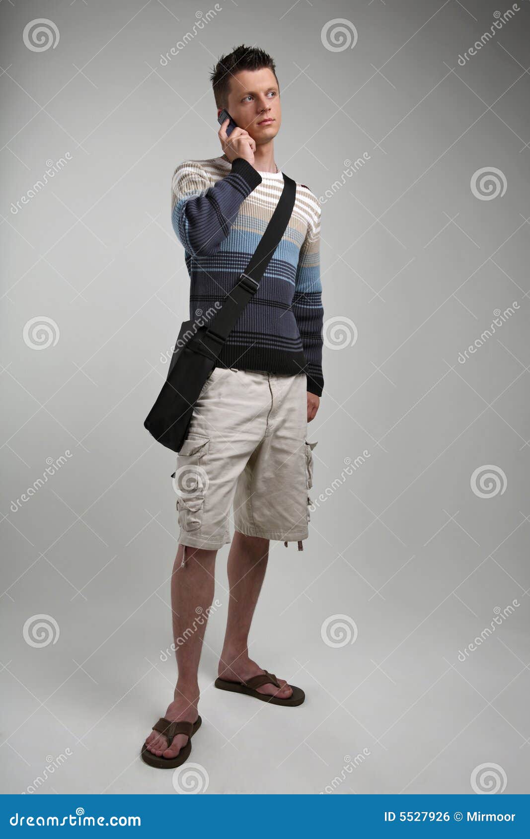 Attractive Young Man on Cellphone Stock Photo - Image of face, person ...