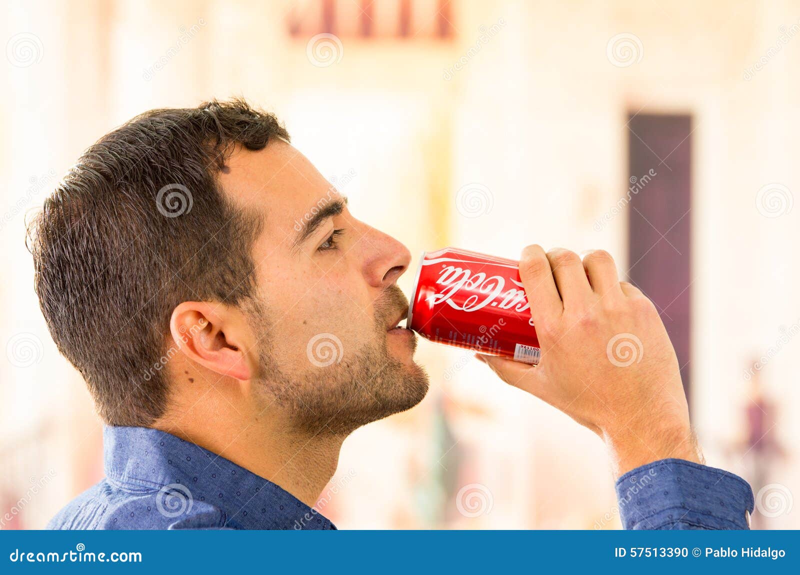 Attractive Young Man Drinking a Coca-Cola Can Editorial Image - Image ...