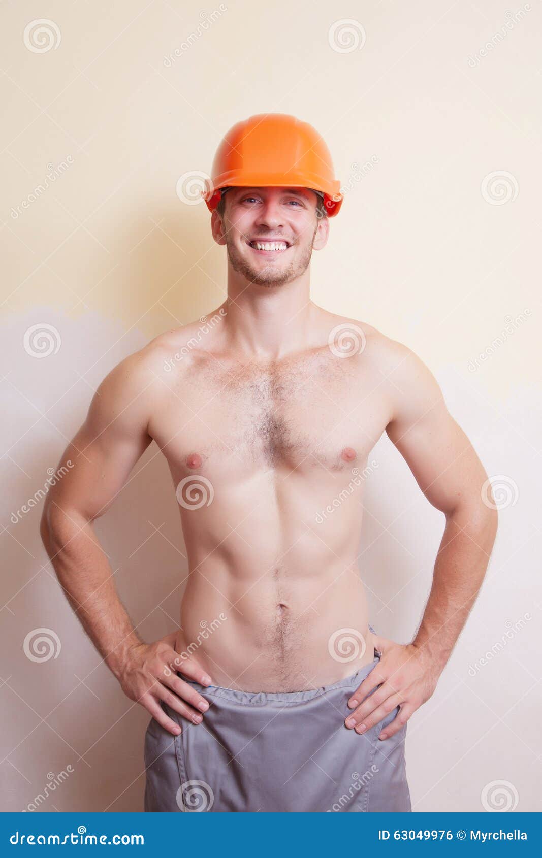 Attractive Young Man in a Helmet Stock Photo - Image of foreman ...