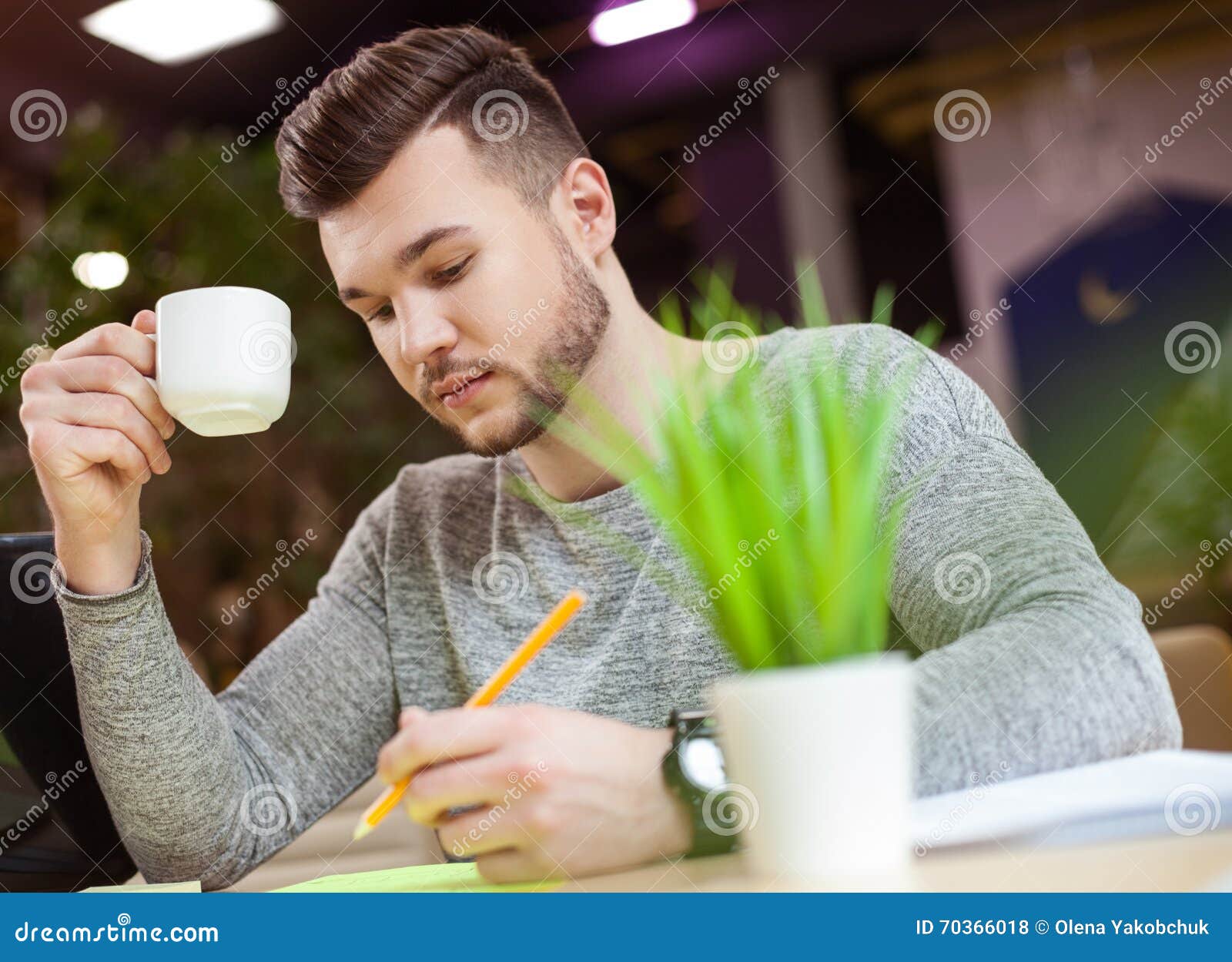 Attractive Young Man is Learning at University Stock Photo - Image of ...