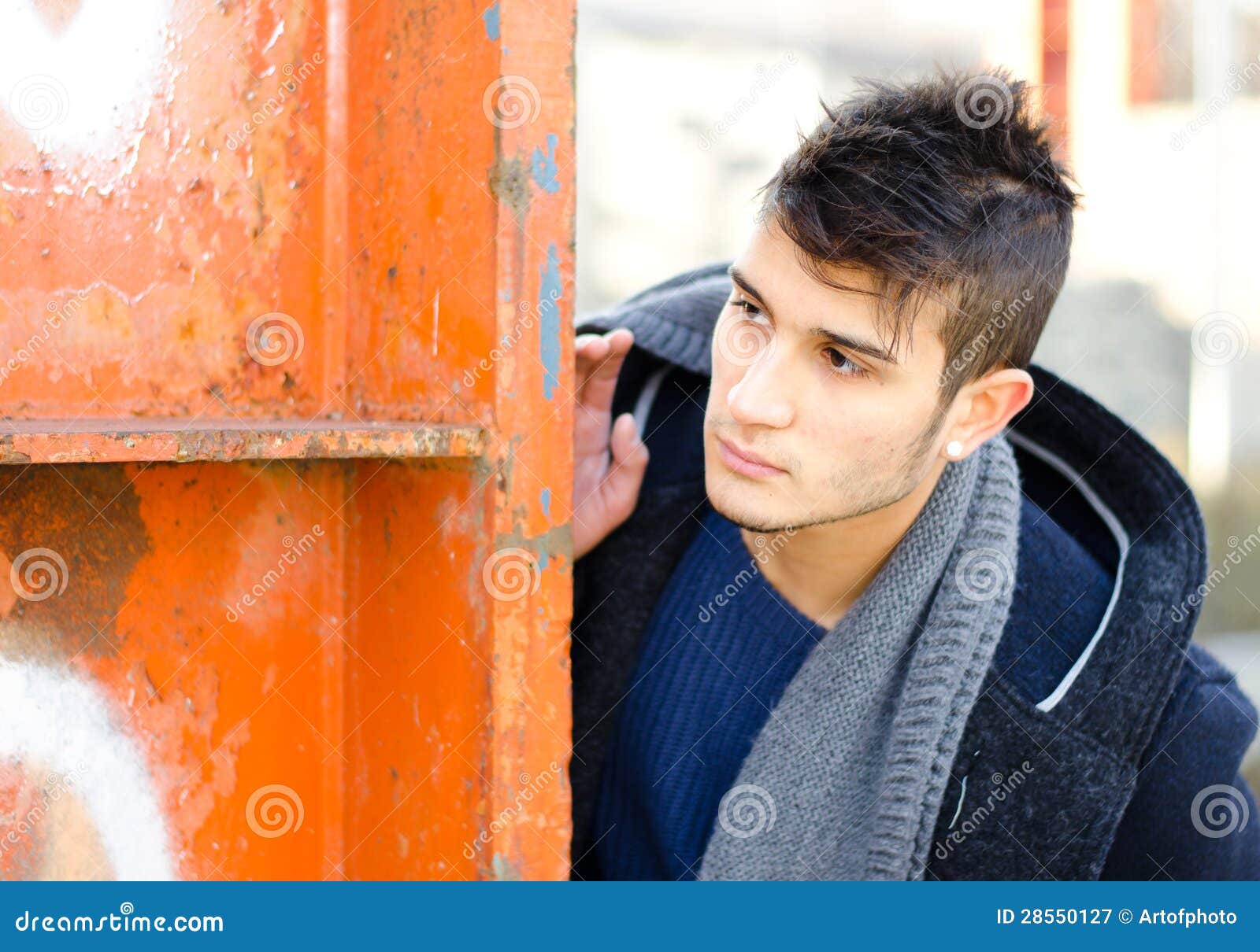 Attractive Young Man Looking Beyond Metal Structure Stock Image - Image ...