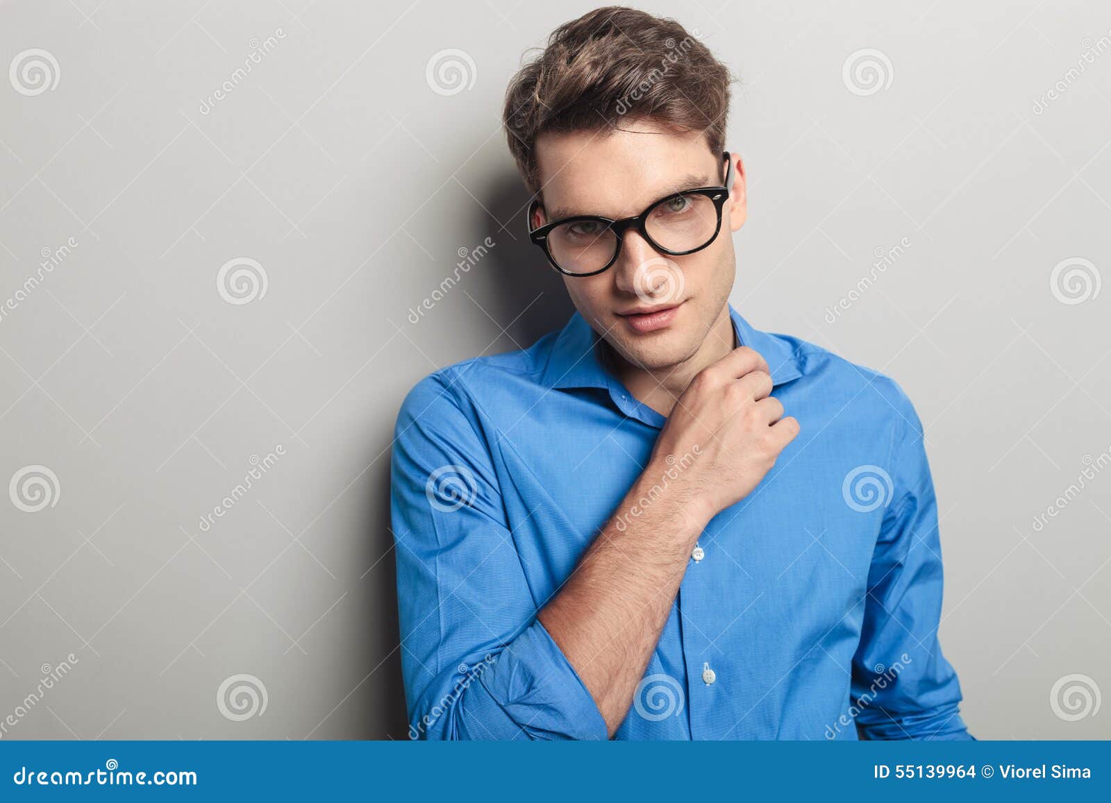 Attractive Young Man Looking at the Camera Stock Photo - Image of ...