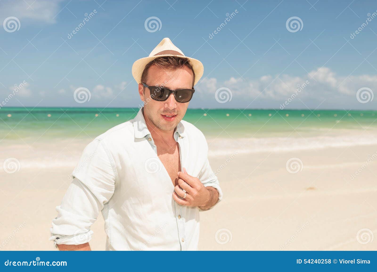 Attractive Young Man Posing on the Beach Stock Photo - Image of rest ...
