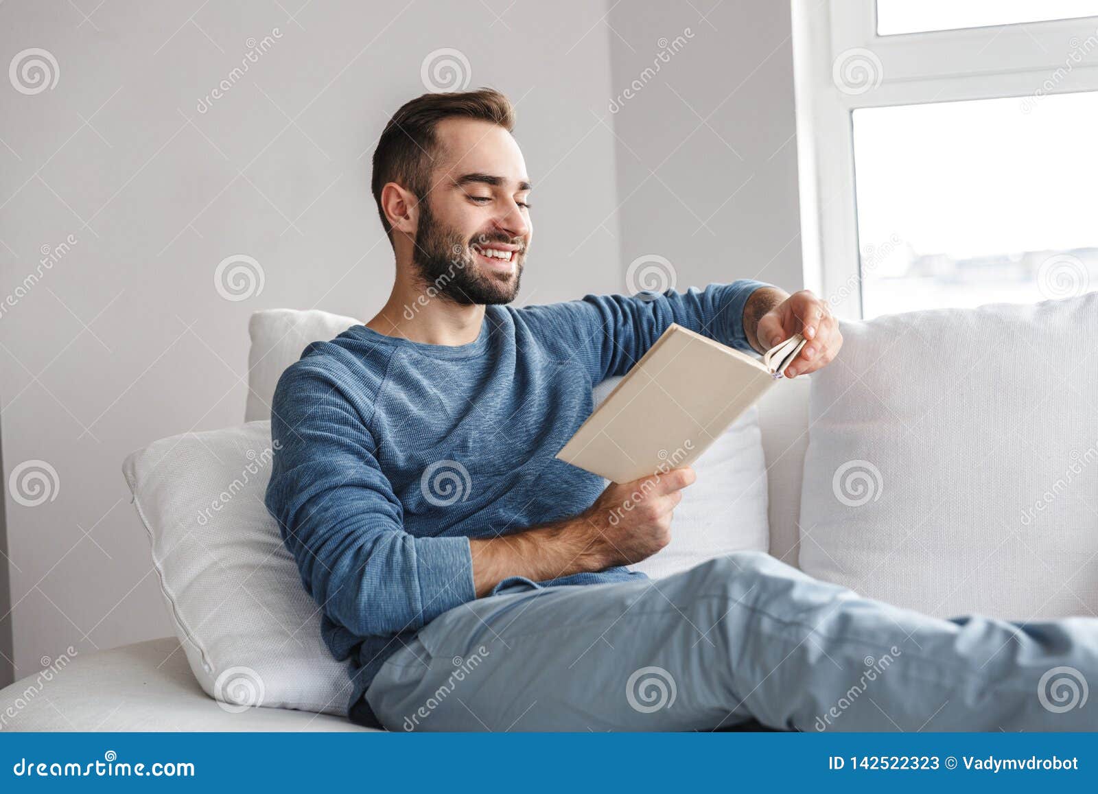 Attractive Young Man Relaxing Stock Image - Image of look, happy: 142522323