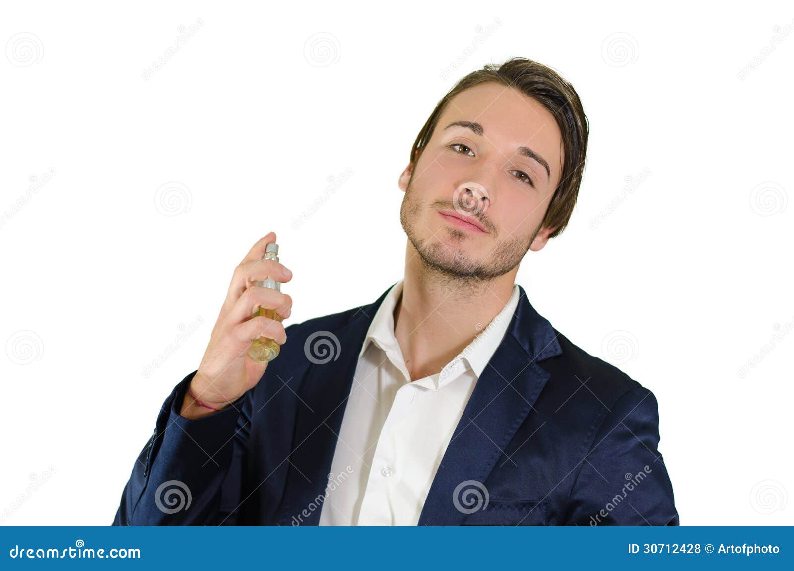 Attractive Young Man Spraying Perfume, Using Fragrance Stock Photo ...