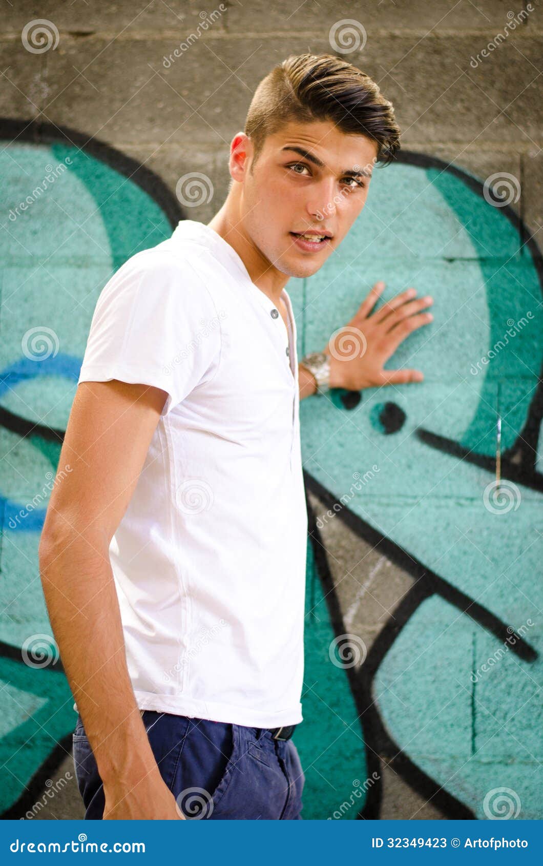 Attractive Young Man Standing in Front of Graffiti Stock Image - Image ... Attractive Young Man Standing in Front of Graffiti Stock Image - Image ...
