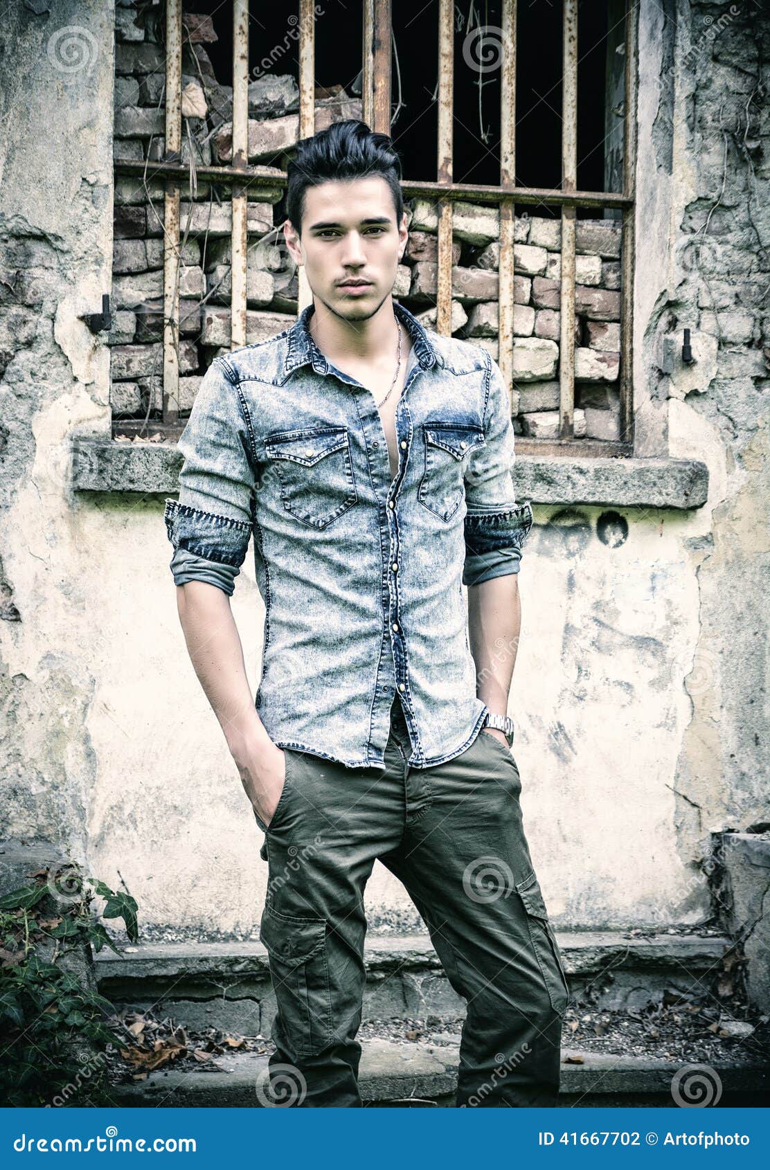 Attractive Young Man Standing Outdoor in Front of Abandoned House Stock ...