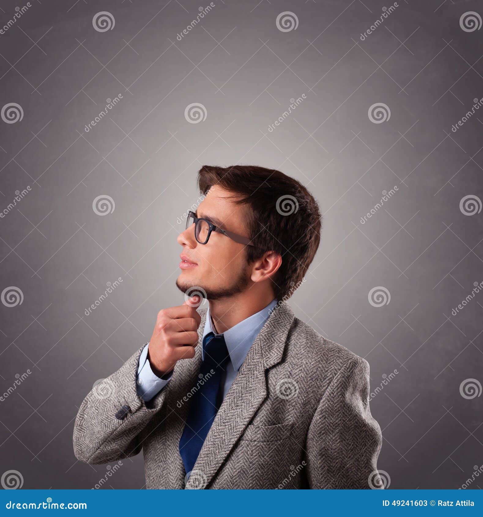 Attractive Young Man Standing and Thinking with Copy Space Stock Image ...