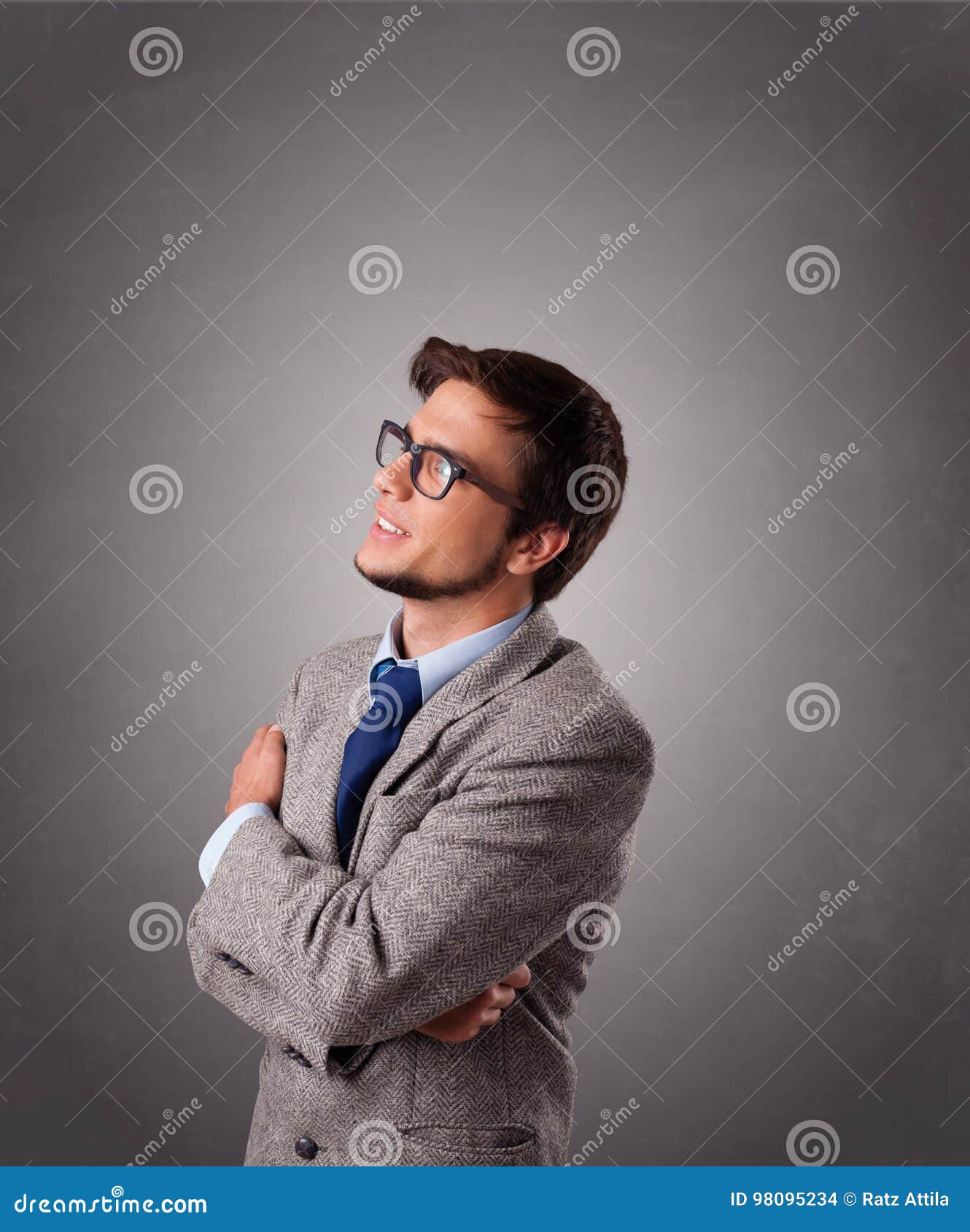 Attractive Young Man Standing and Thinking with Copy Space Stock Photo ...