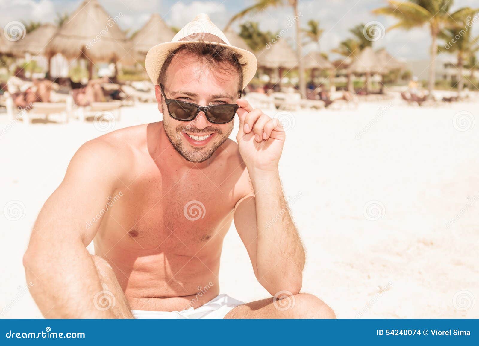 Attractive Young Man Taking Off His Sunglasses. Stock Photo - Image of ...