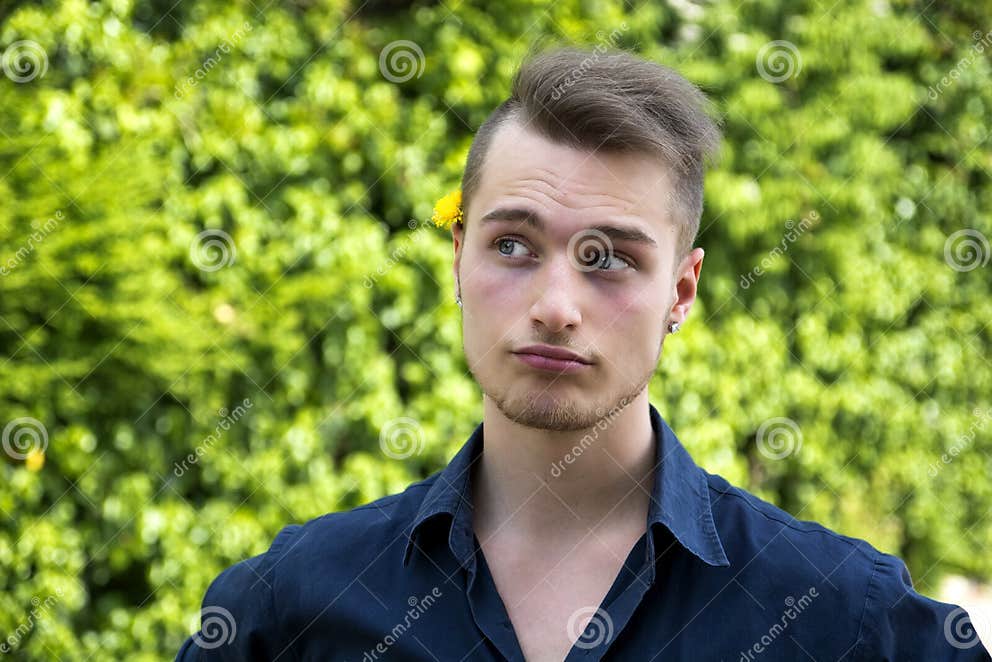 Attractive Young Man with Unsure Expression, Thinking Stock Photo ...
