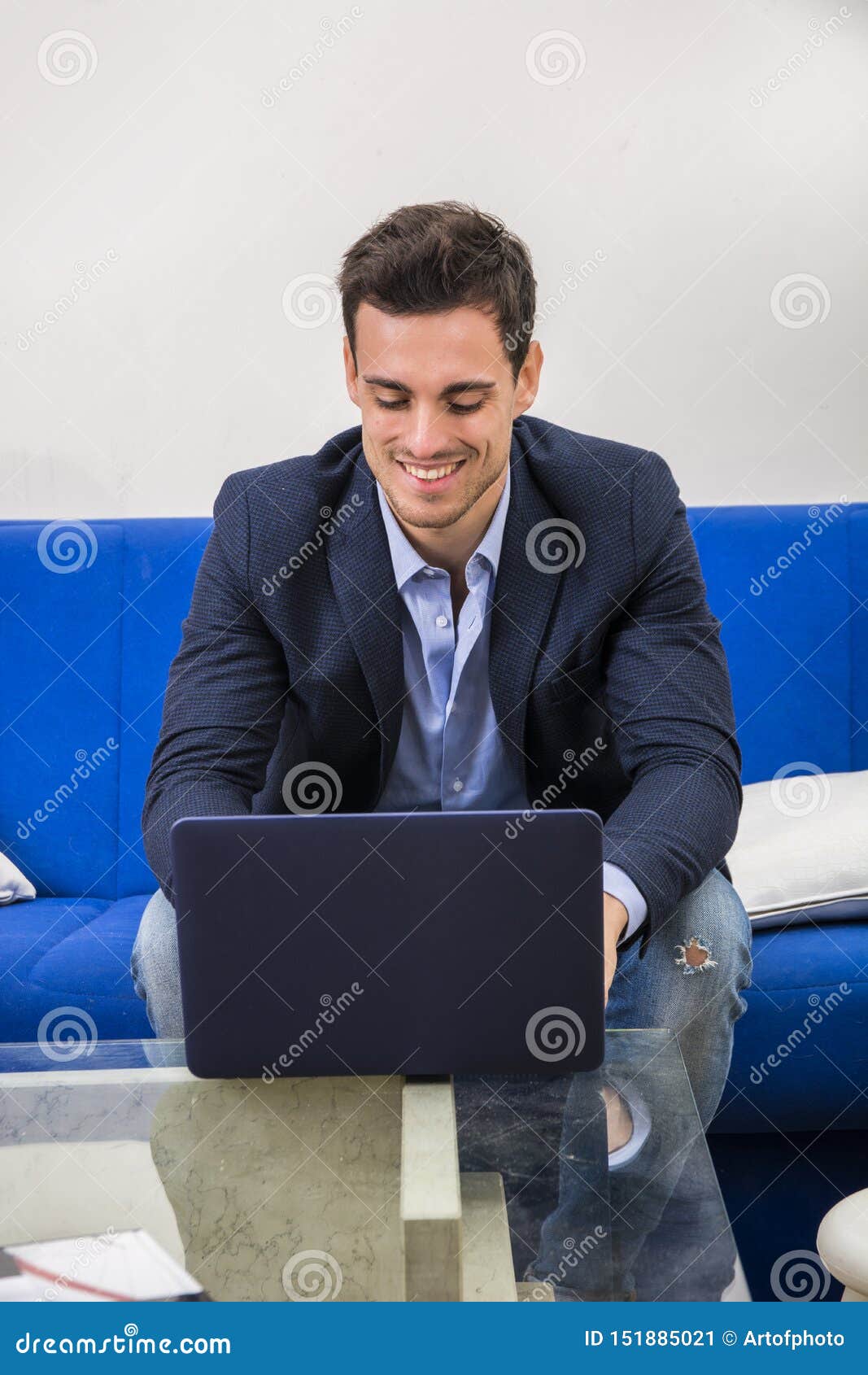 Attractive Young Man Using Laptop PC on Couch Stock Image - Image of ...