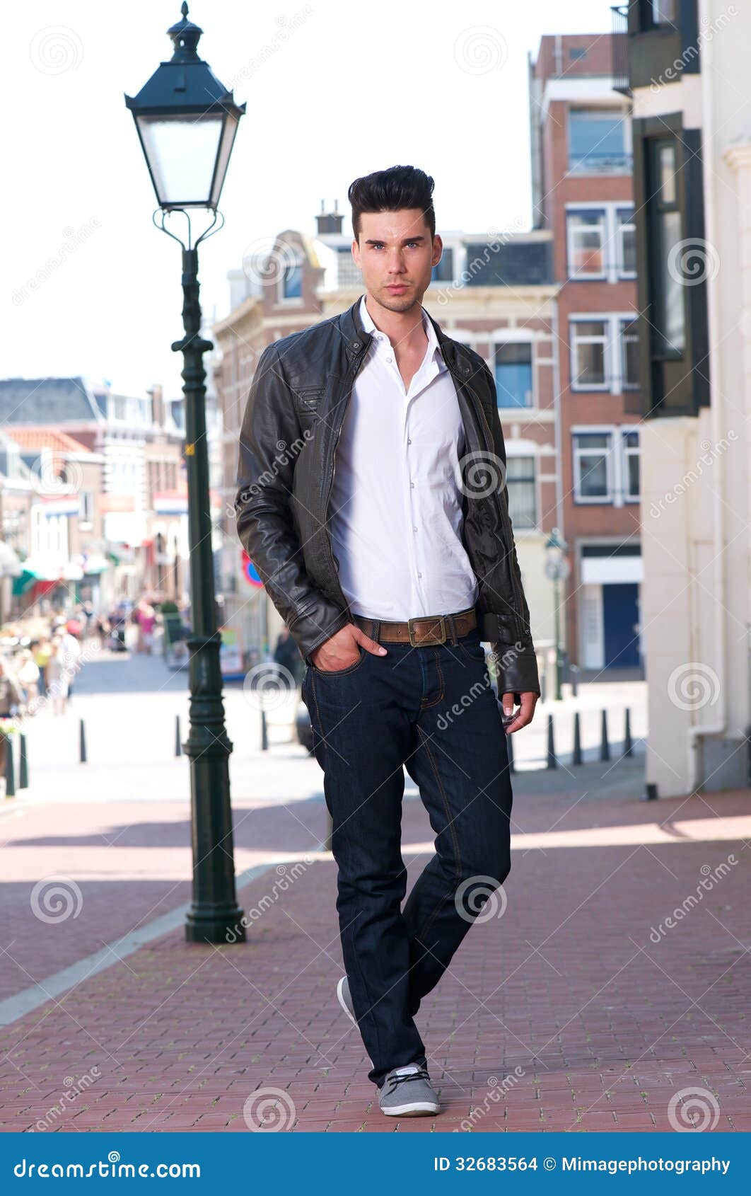 Attractive Young Man Walking Outdoors Stock Photo - Image of leather ...