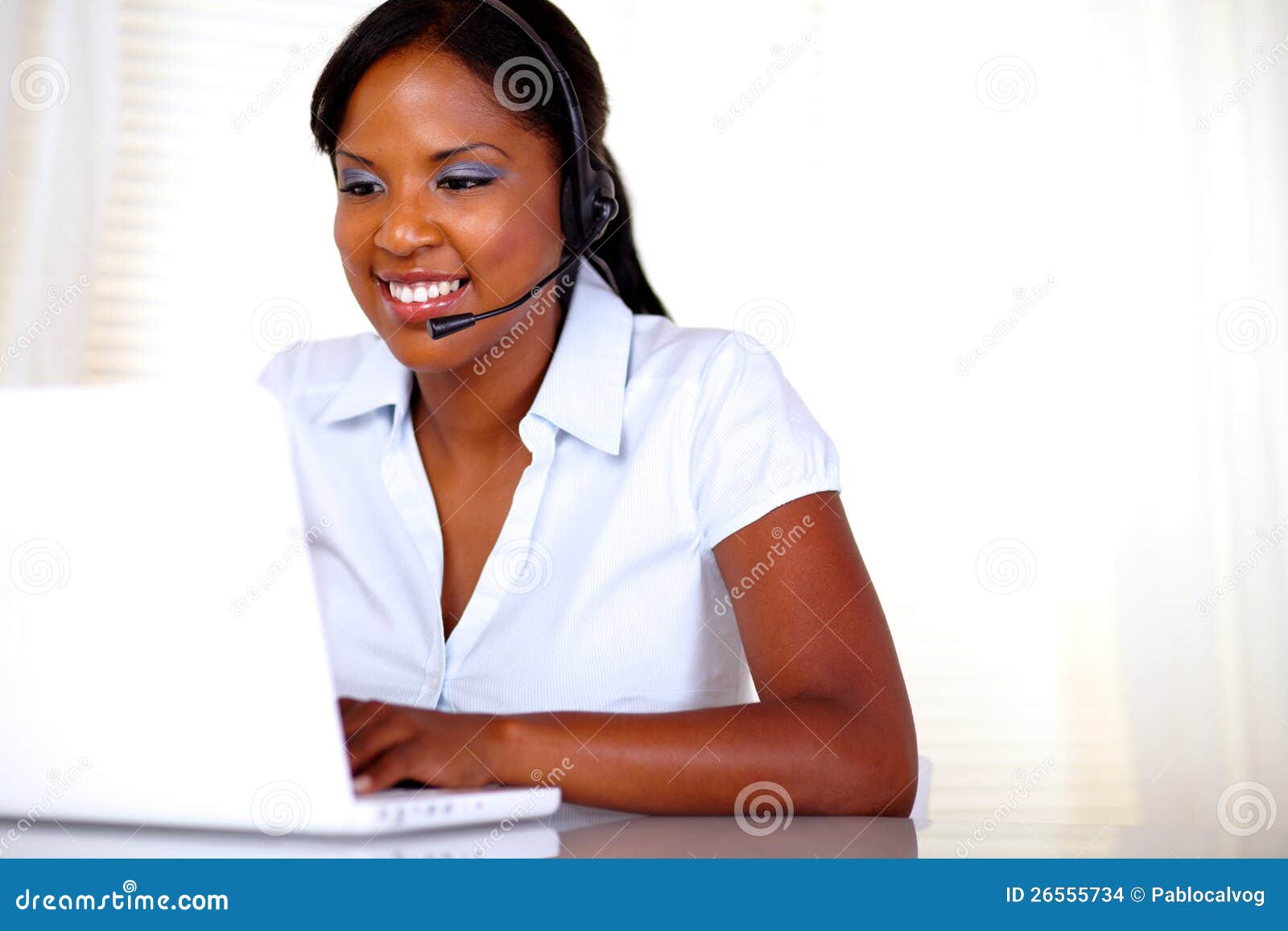 Attractive Young Operator Working on Laptop Stock Photo - Image of ...