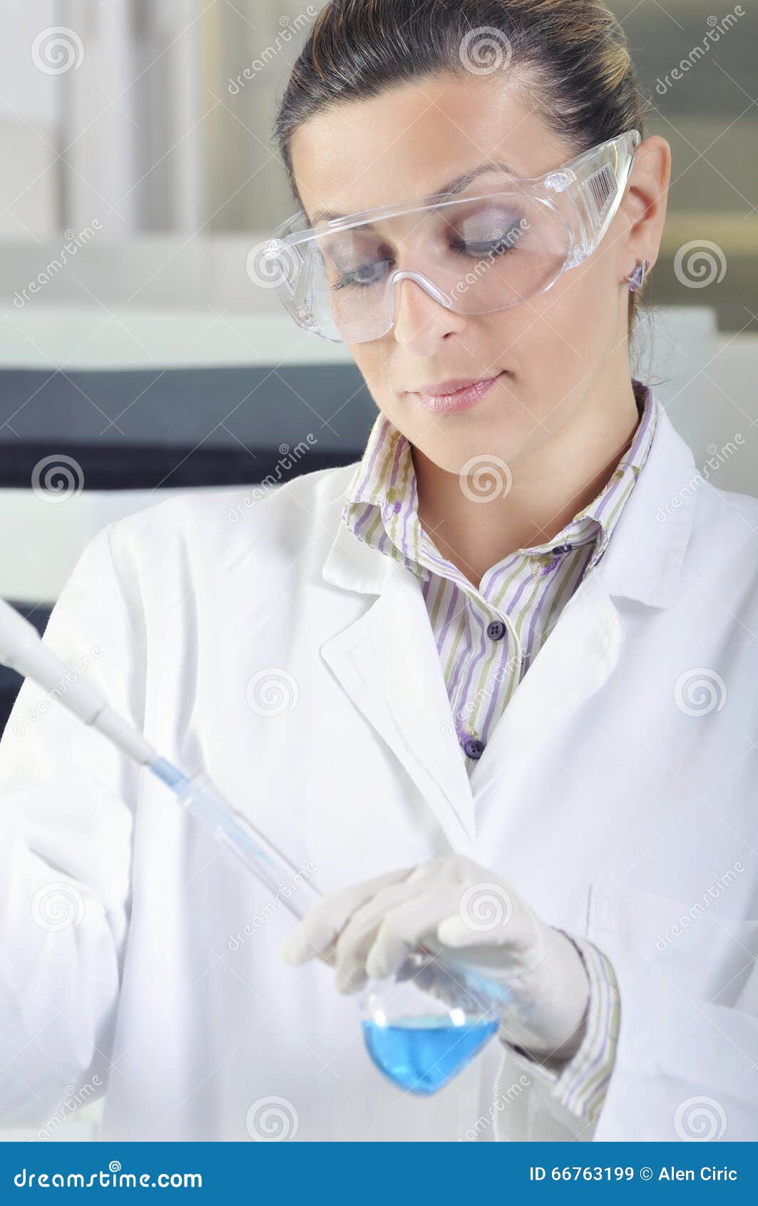 Attractive Young PhD Student Scientist Observing the Color Shift after ...