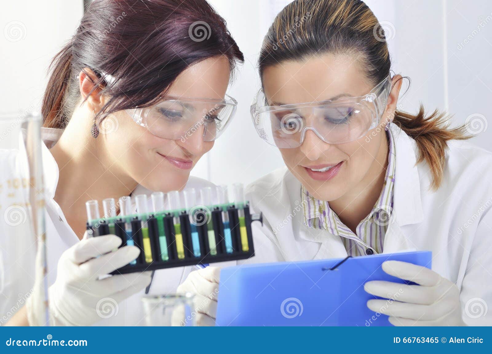 Attractive Young PhD Students Scientists Observing the Color Shift ...