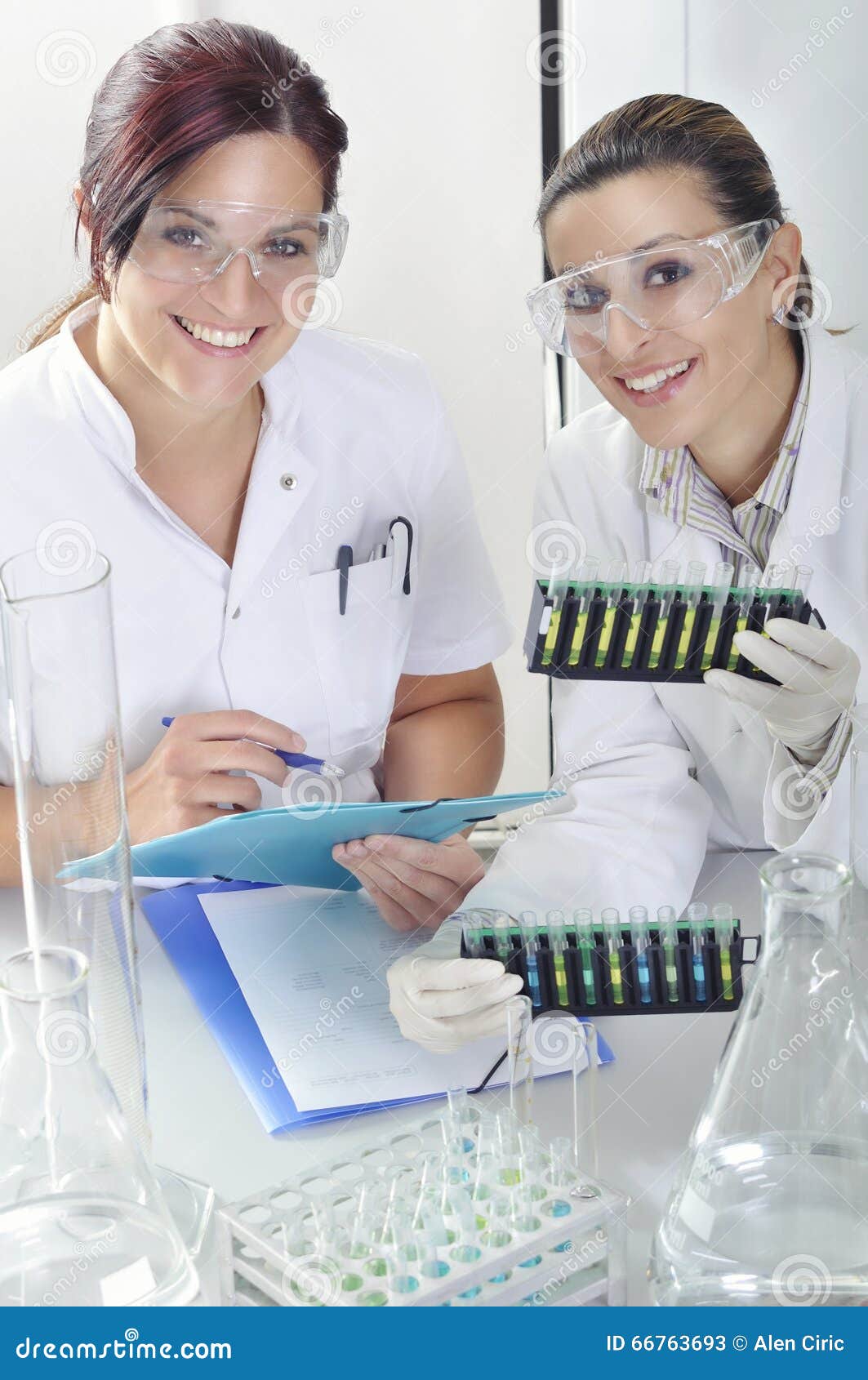 Attractive Young PhD Students Scientists Observing the Color Shift ...