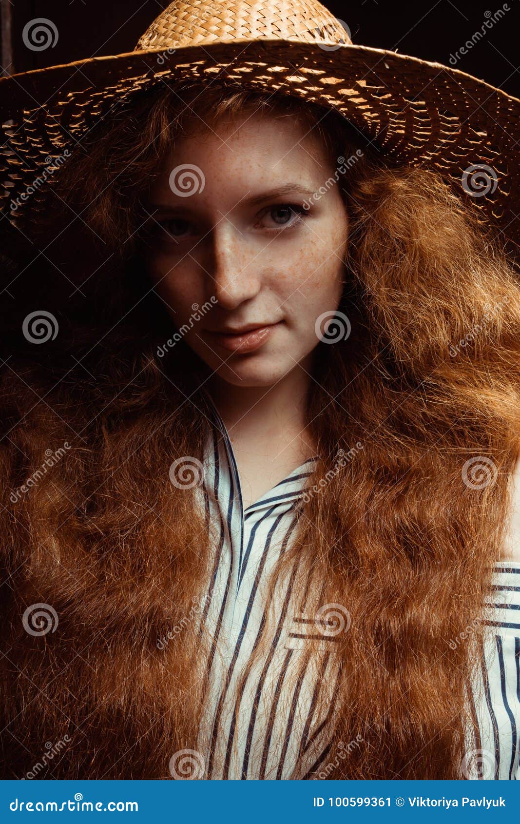 Attractive Young Red Haired Model With Curly Hair In Straw Hat P Stock