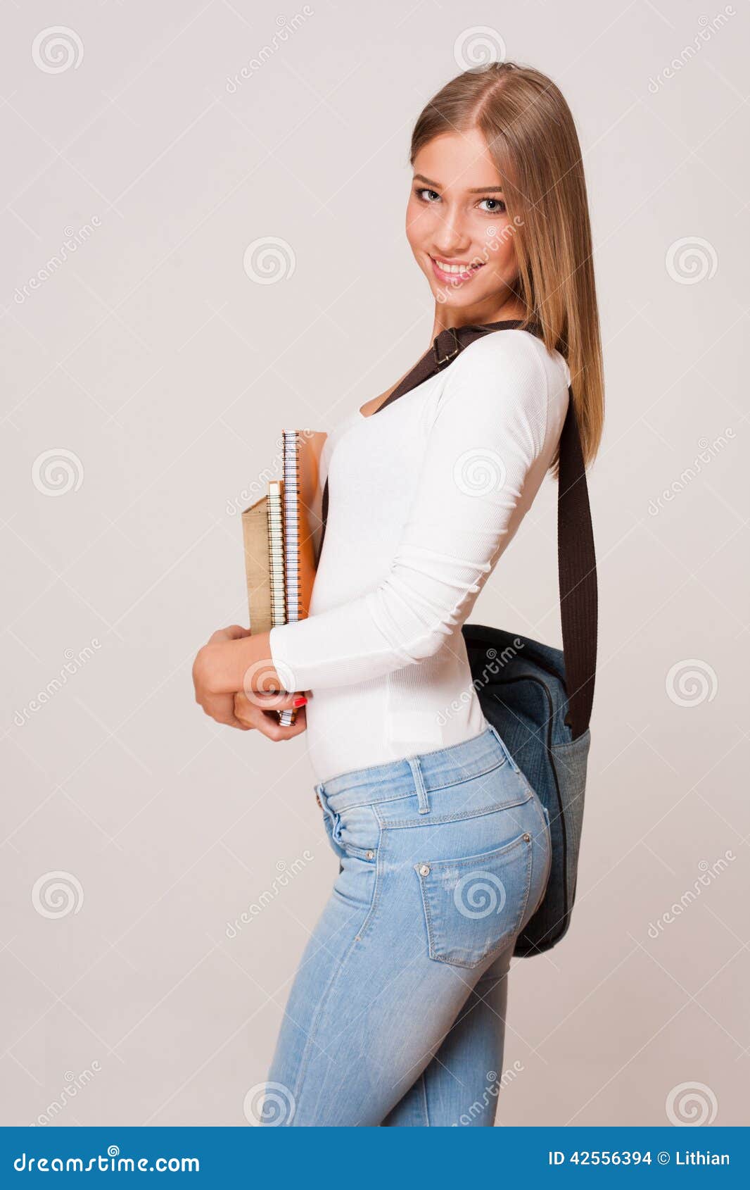 Attractive young student. stock photo. Image of backpack - 42556394