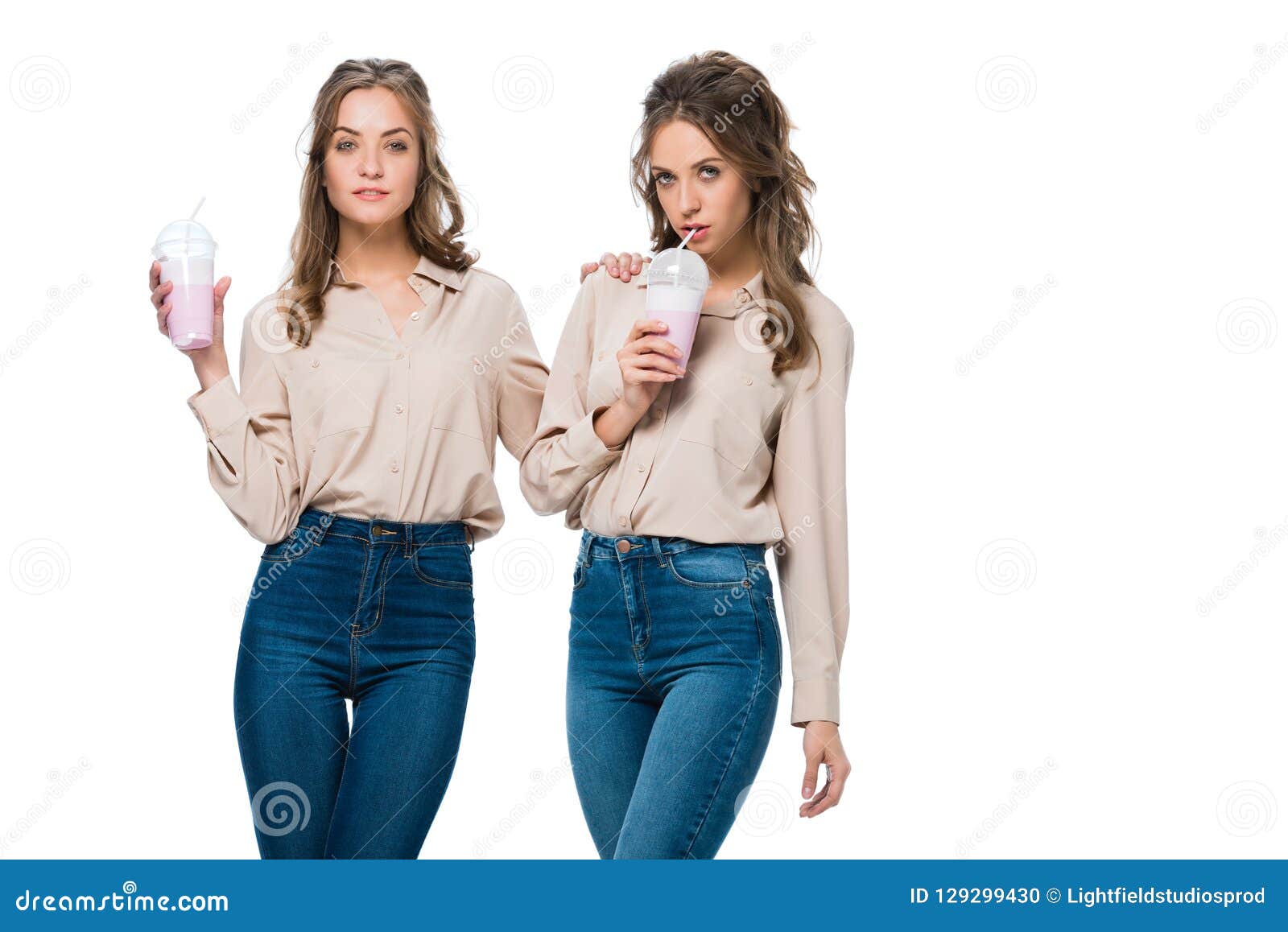 Attractive Young Twins Drinking Milkshakes Stock Photo - Image of girls ...