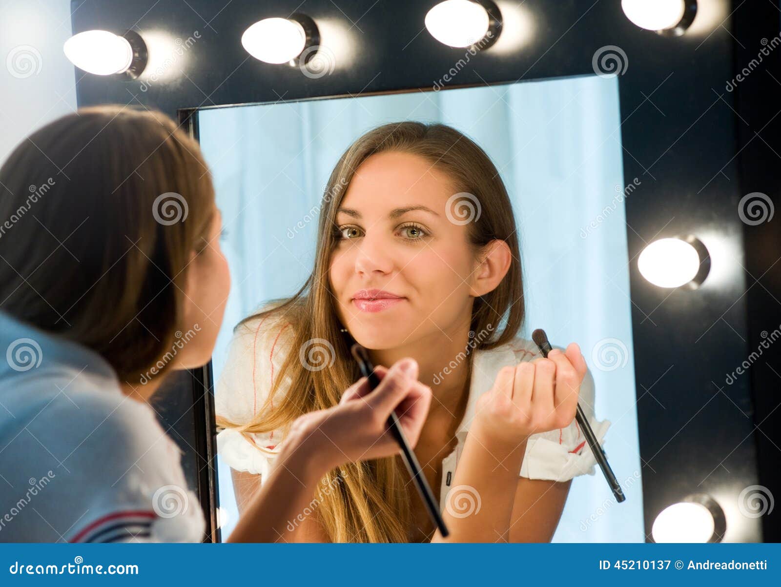 Attractive Young Woman Applying Her Makeup Stock Image - Image of ...