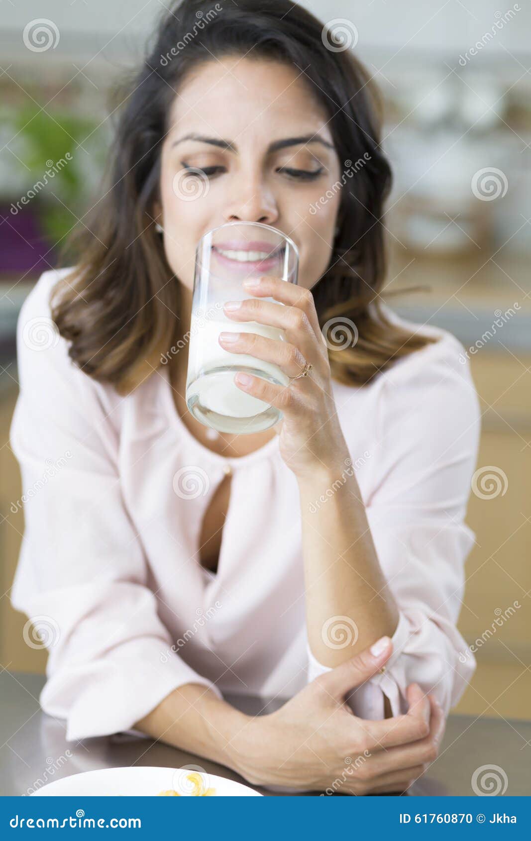 Attractive Young Woman Drinking Milk Stock Photo - Image of indoors ...