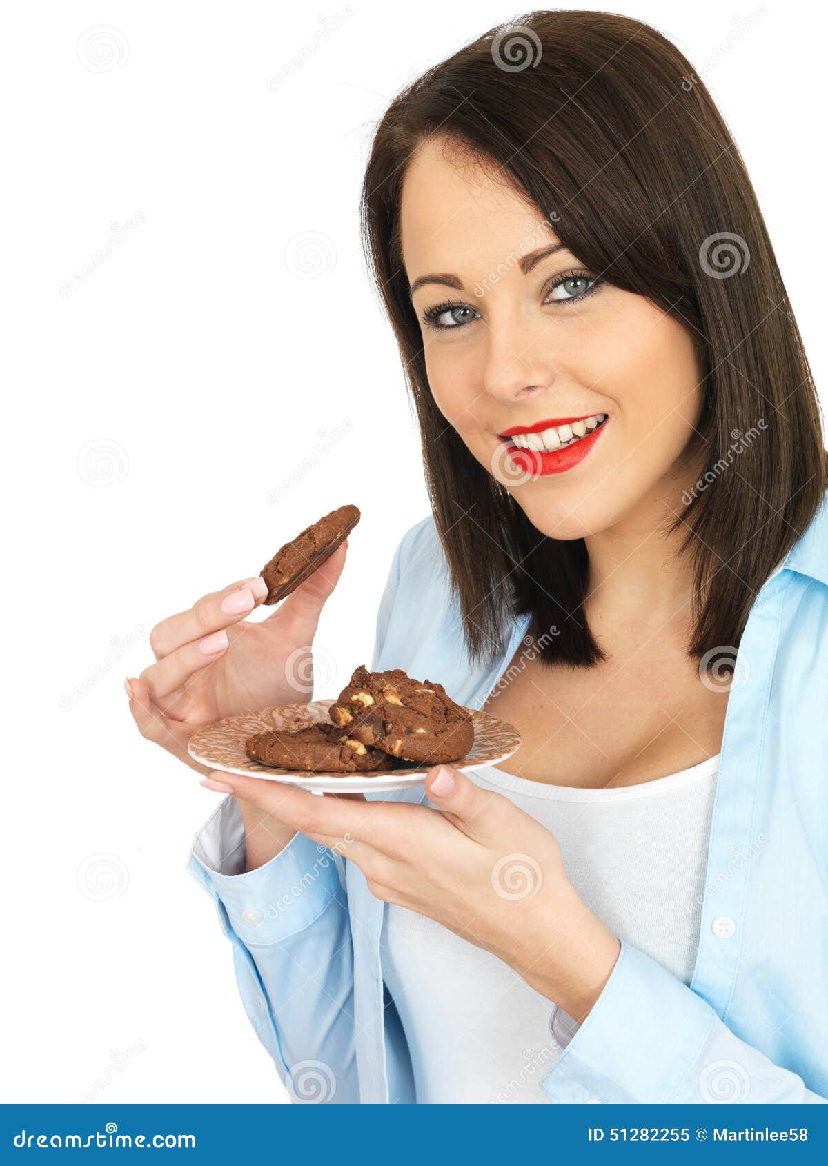 Attractive Young Woman Eating Chocolate Biscuits Stock Image - Image of ...