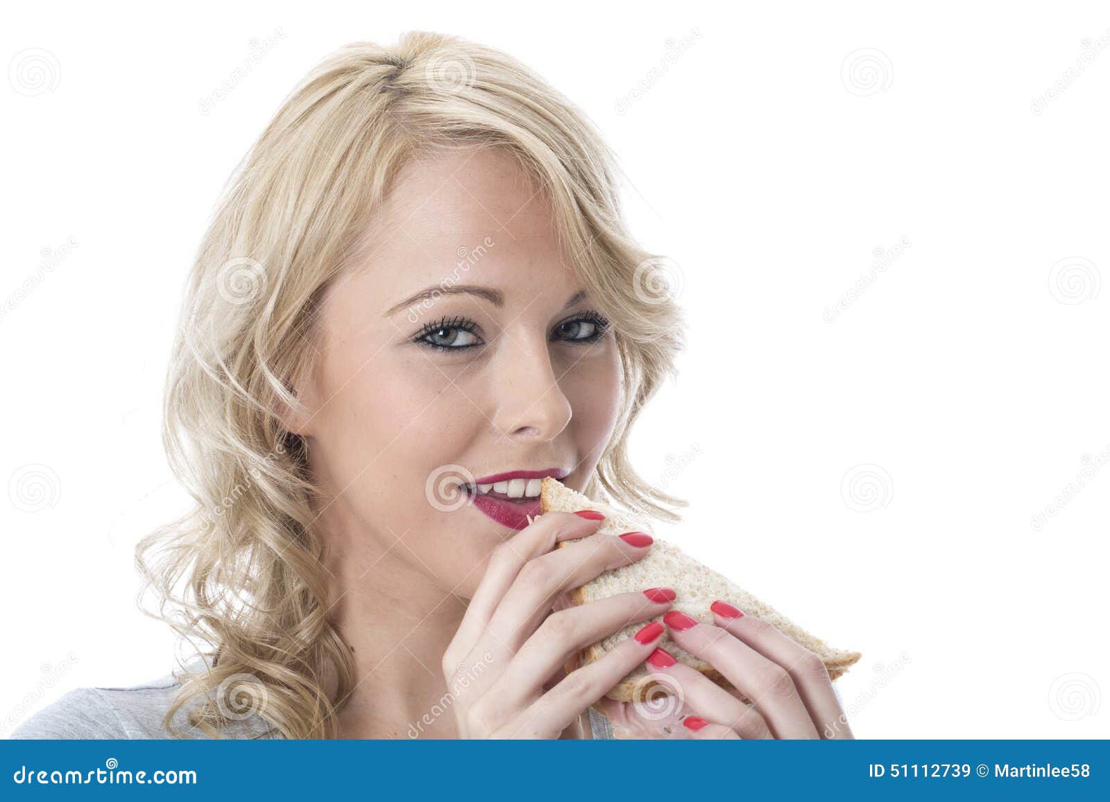 Attractive Young Woman Eating a Sandwich Stock Image - Image of ...