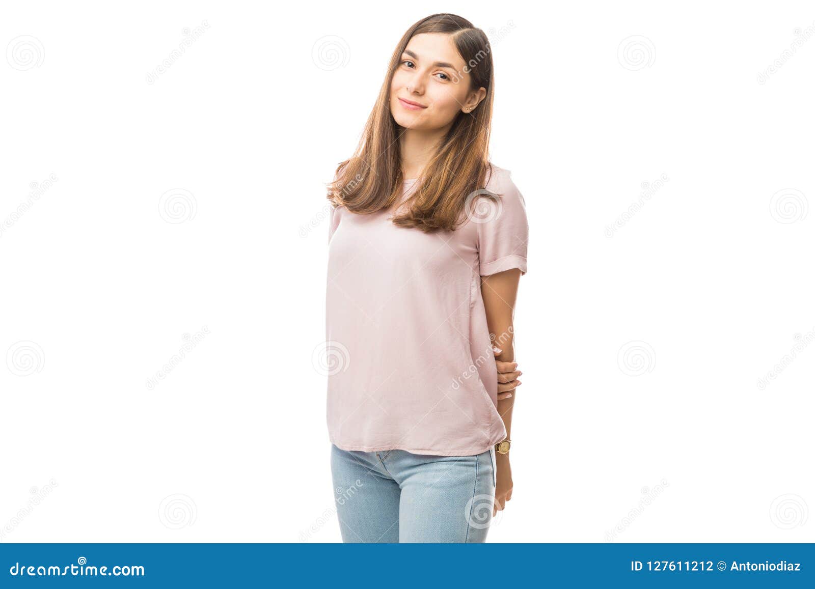 Attractive Young Woman with Hands Behind Back Stock Photo - Image of ... Attractive Young Woman with Hands Behind Back Stock Photo - Image of ...