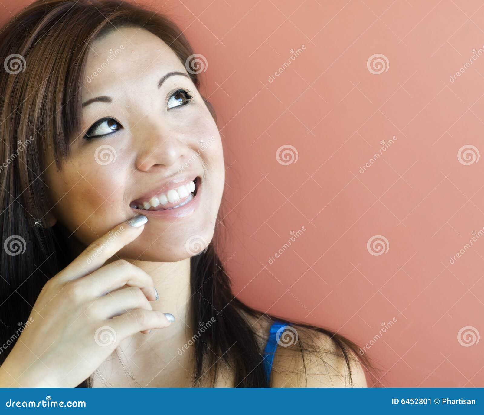 Attractive Young Woman Looking Upwards Stock Image - Image of ...