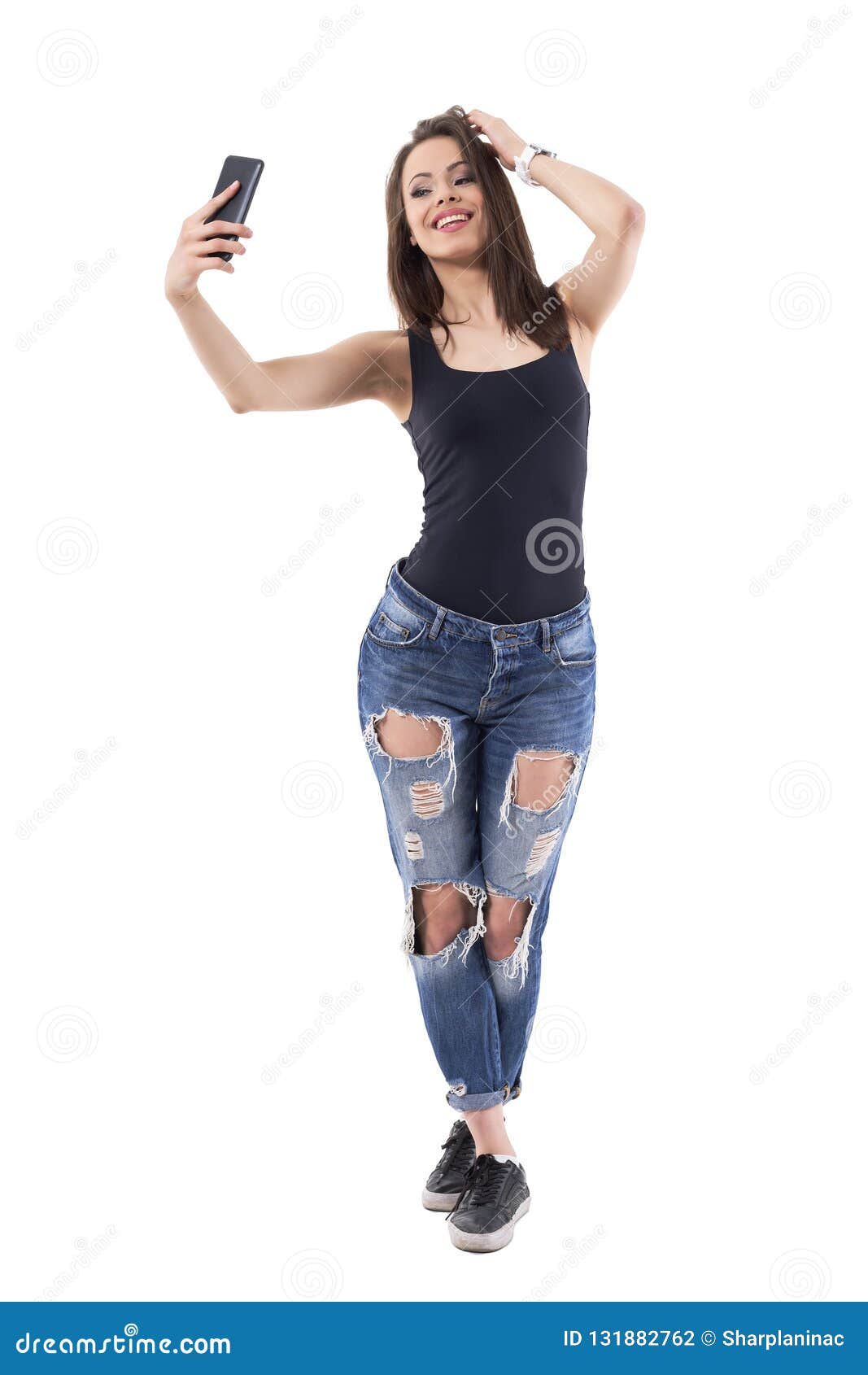 Attractive Young Woman Posing And Taking Selfie Photos With Mobile