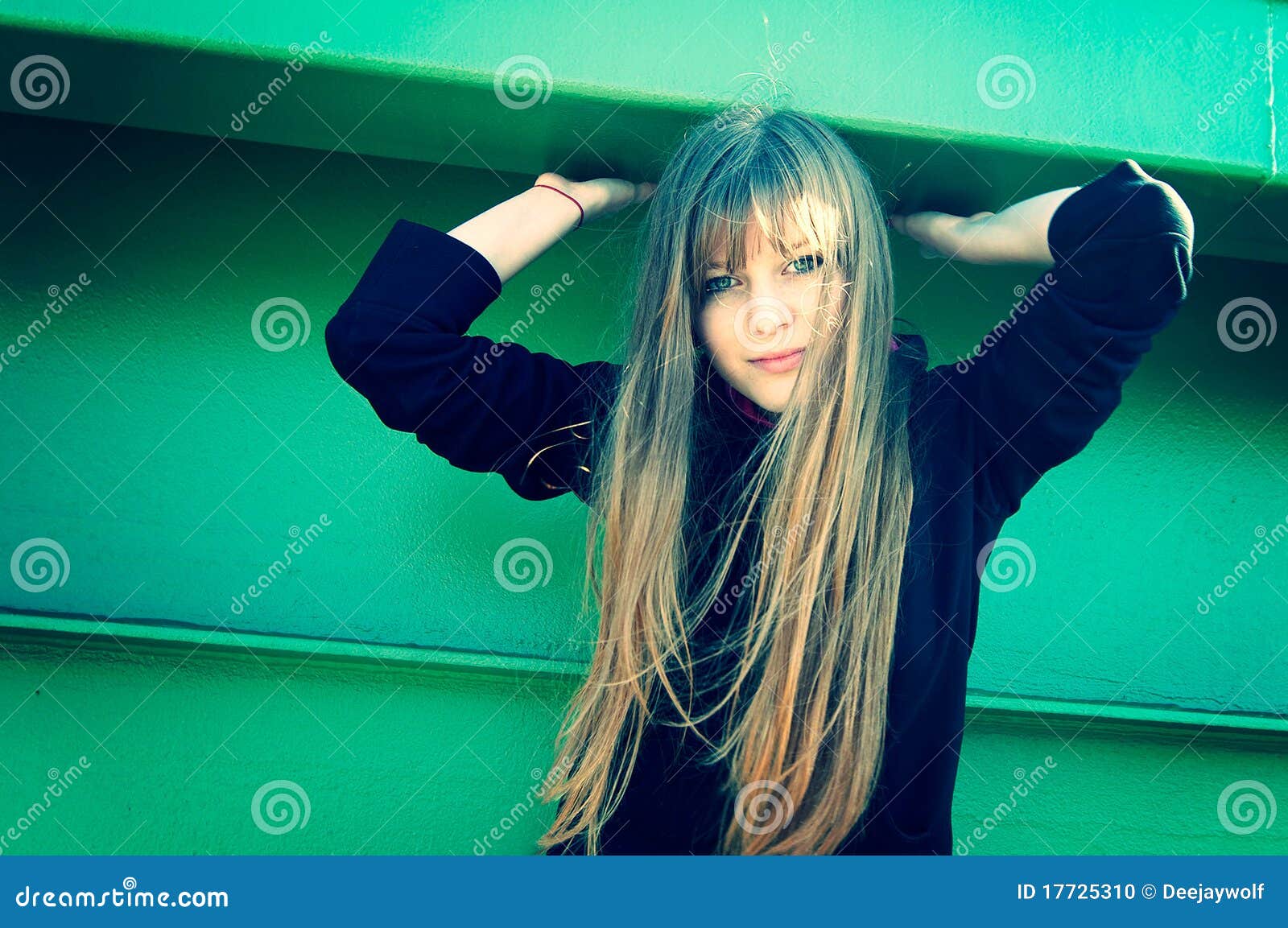 Attractive Young Woman Posing by the Wall Stock Photo - Image of cute ...