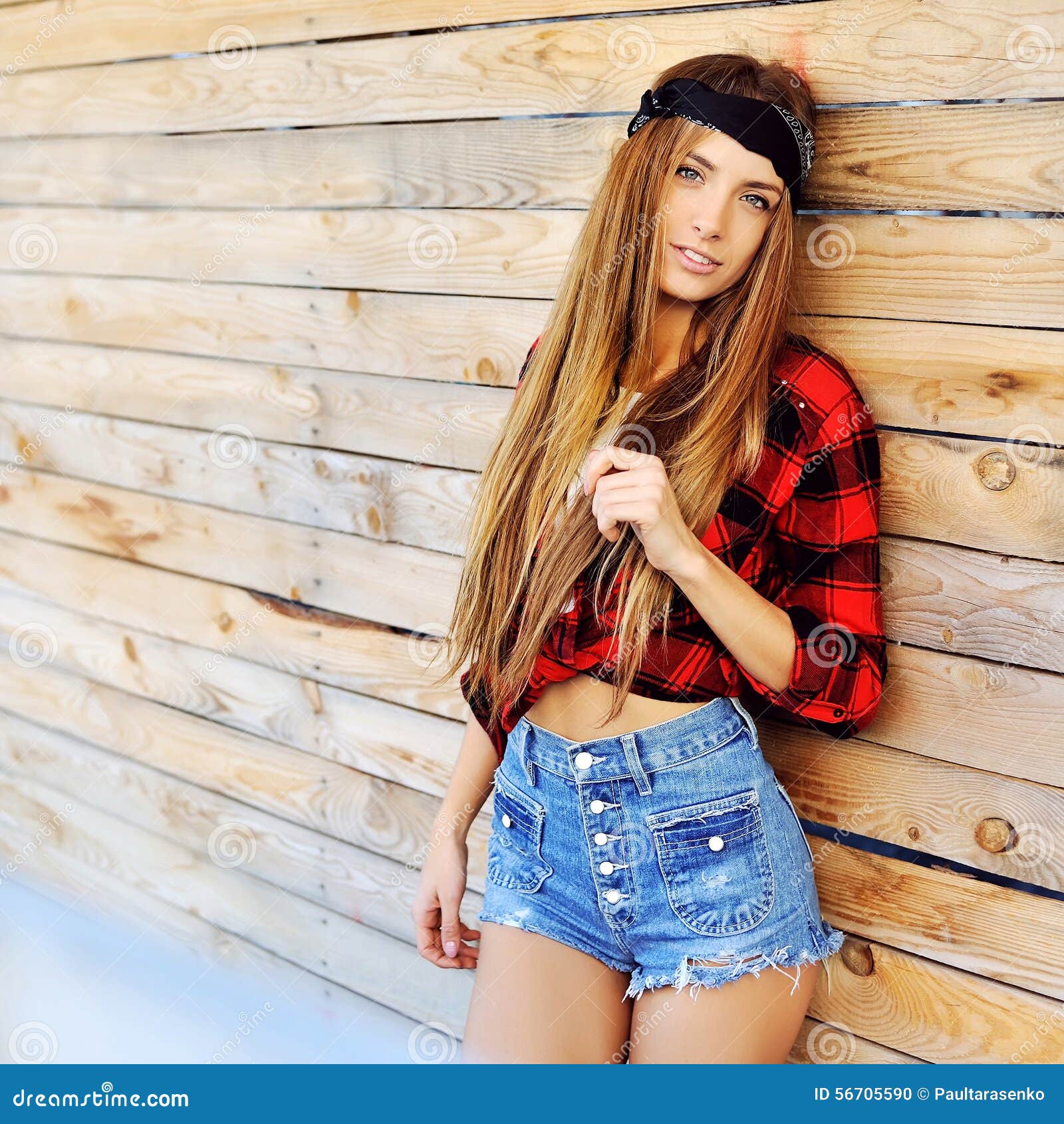 Attractive Young Woman Posing by the Wall Stock Photo - Image of ...