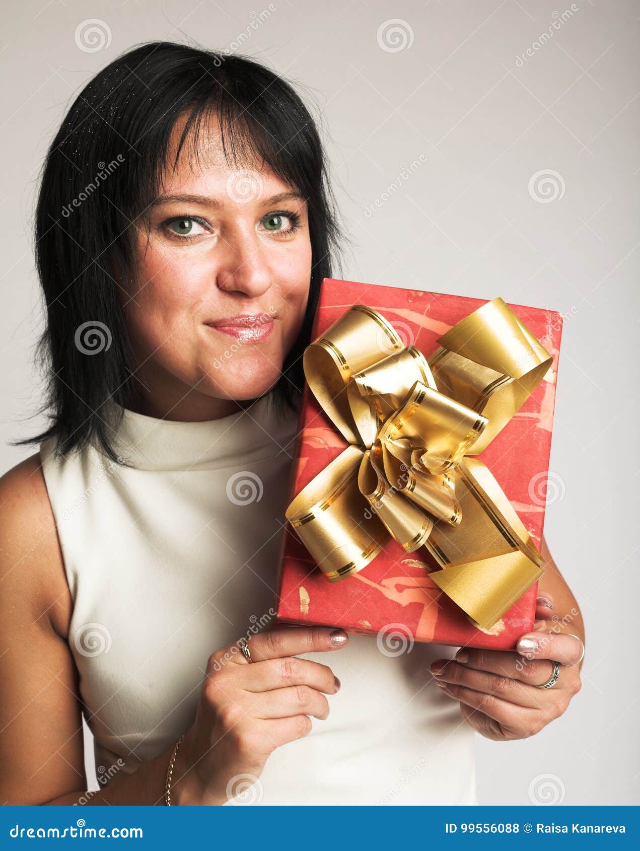 Woman with present stock photo. Image of celebration - 99556088